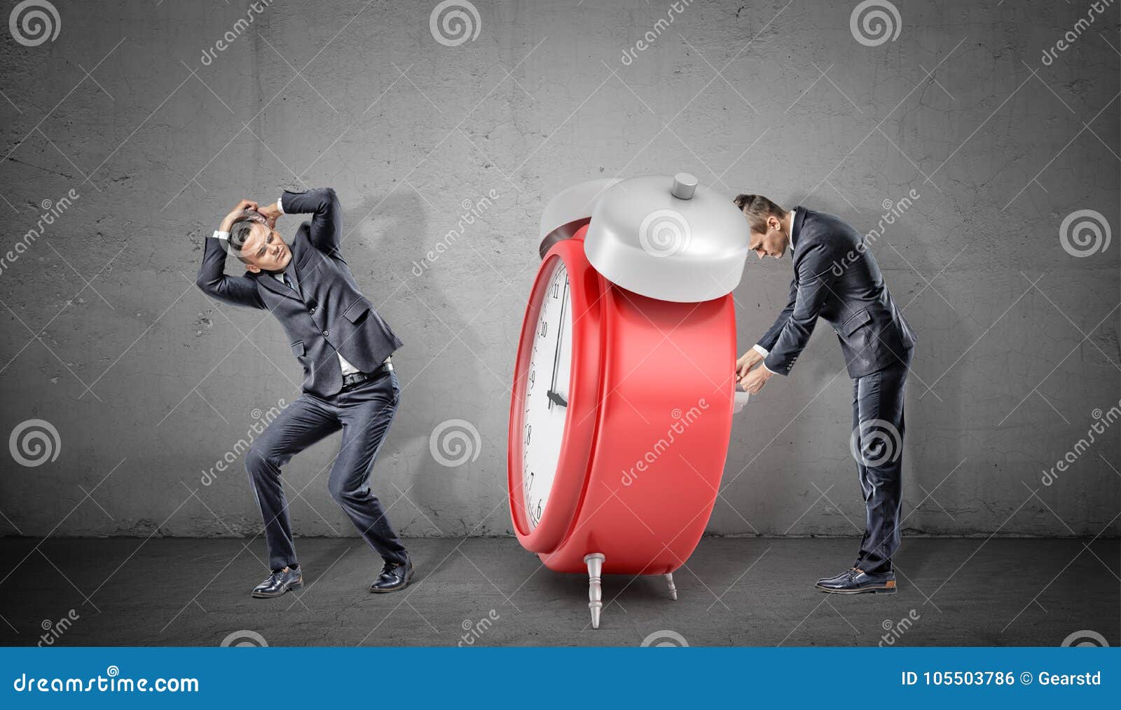 A Businessman Covers His Head Form A Giant Red Retro Alarm Clock Being Winded Up By Another