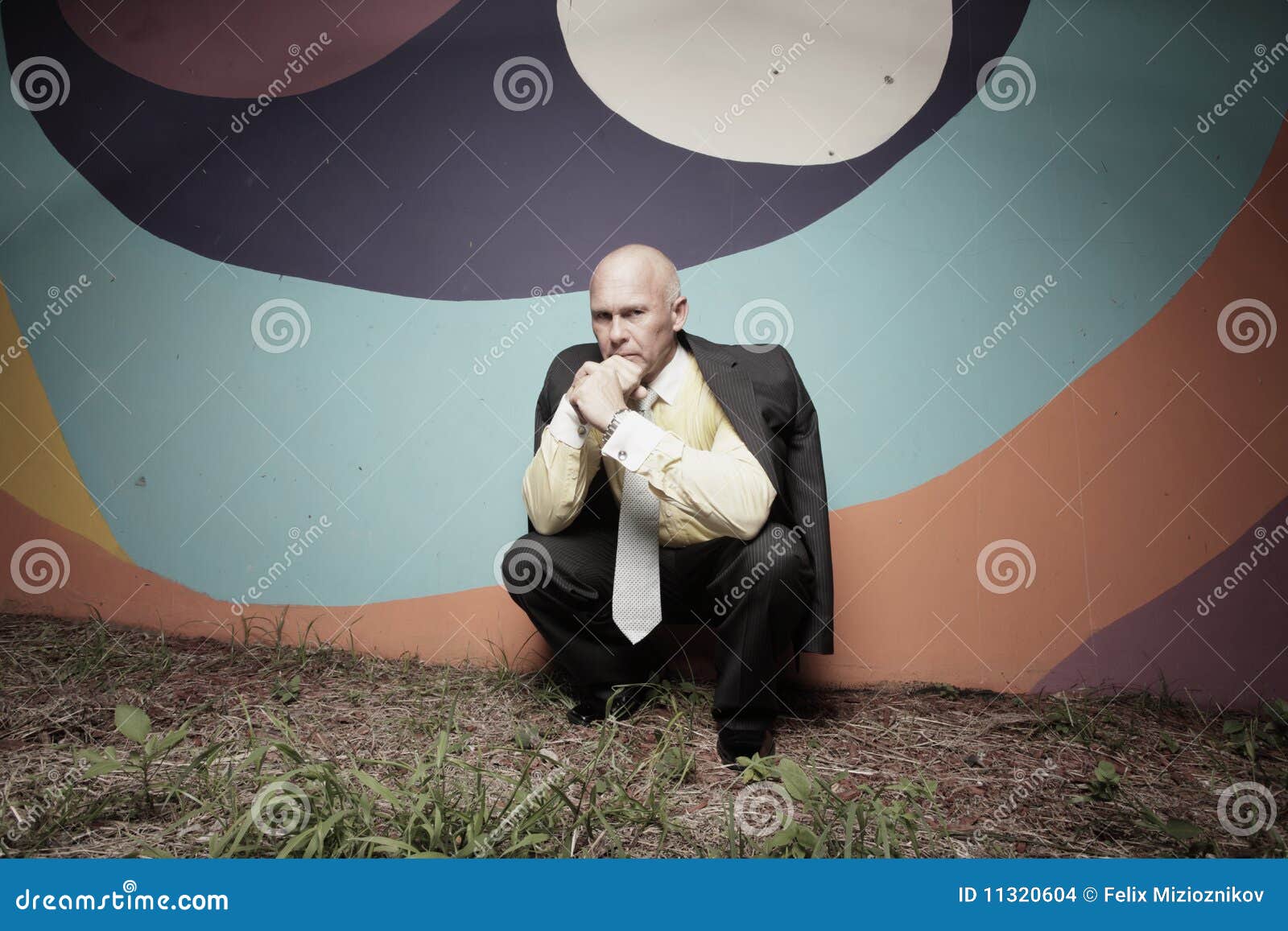 Businessman Crouching in the Dark Stock Photo - Image of business ...