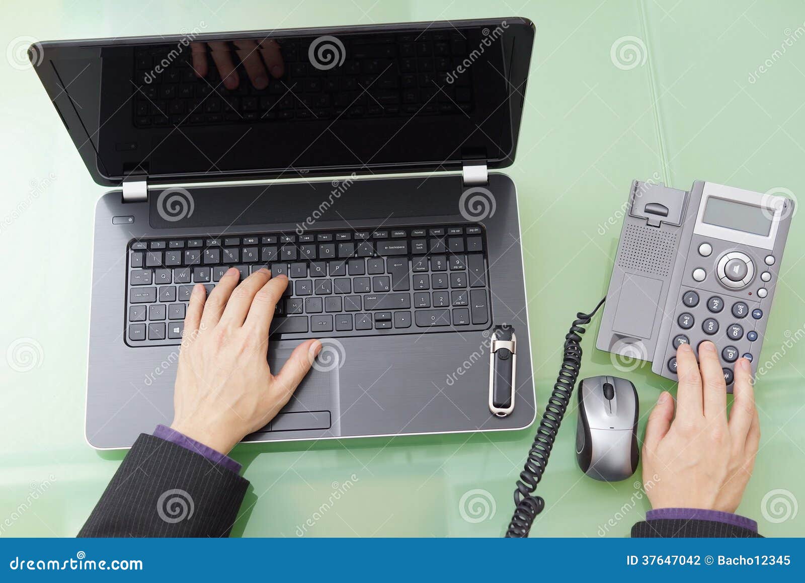 Businessman is Dialing for Support and Working on Laptop Stock Photo ...