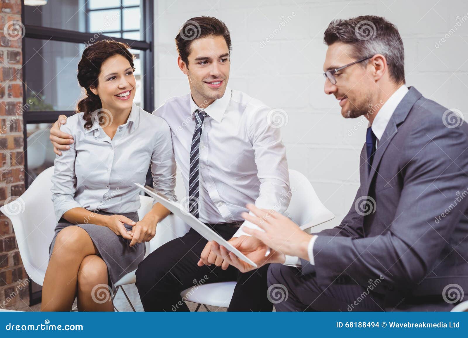 Businessman Discussing with Client Stock Photo - Image of businesswoman ...