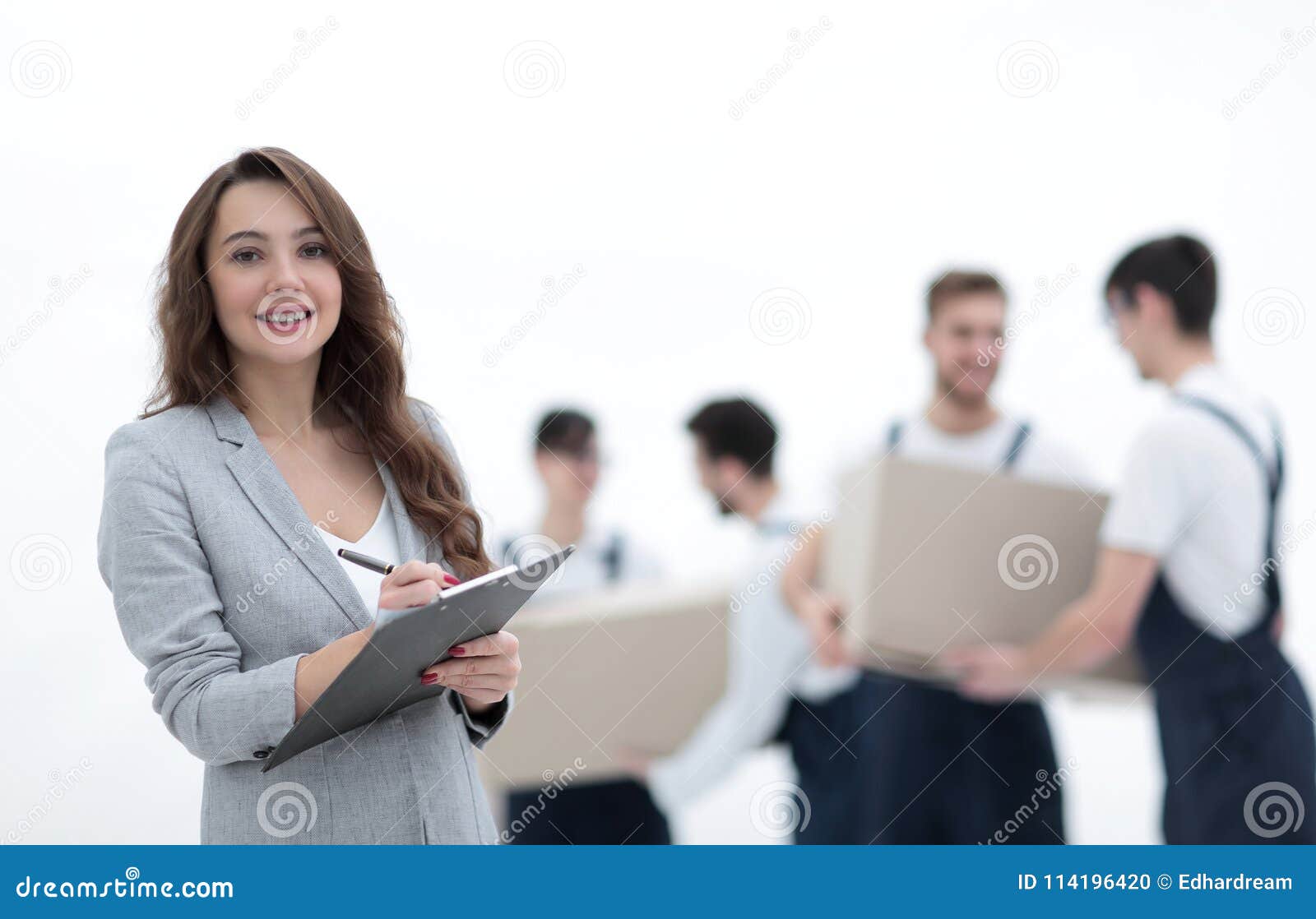Businessman with Documents, Creating a Stack of Cardboard Boxes. Stock ...