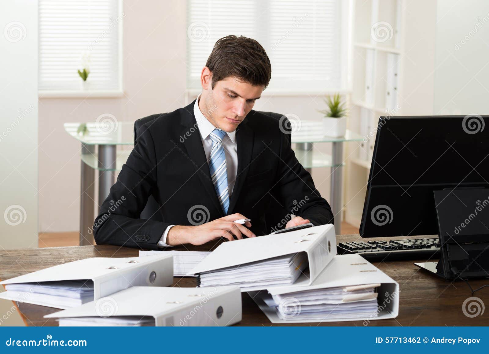 Businessman Doing Accounting Stock Photo - Image of office, desk: 57713462