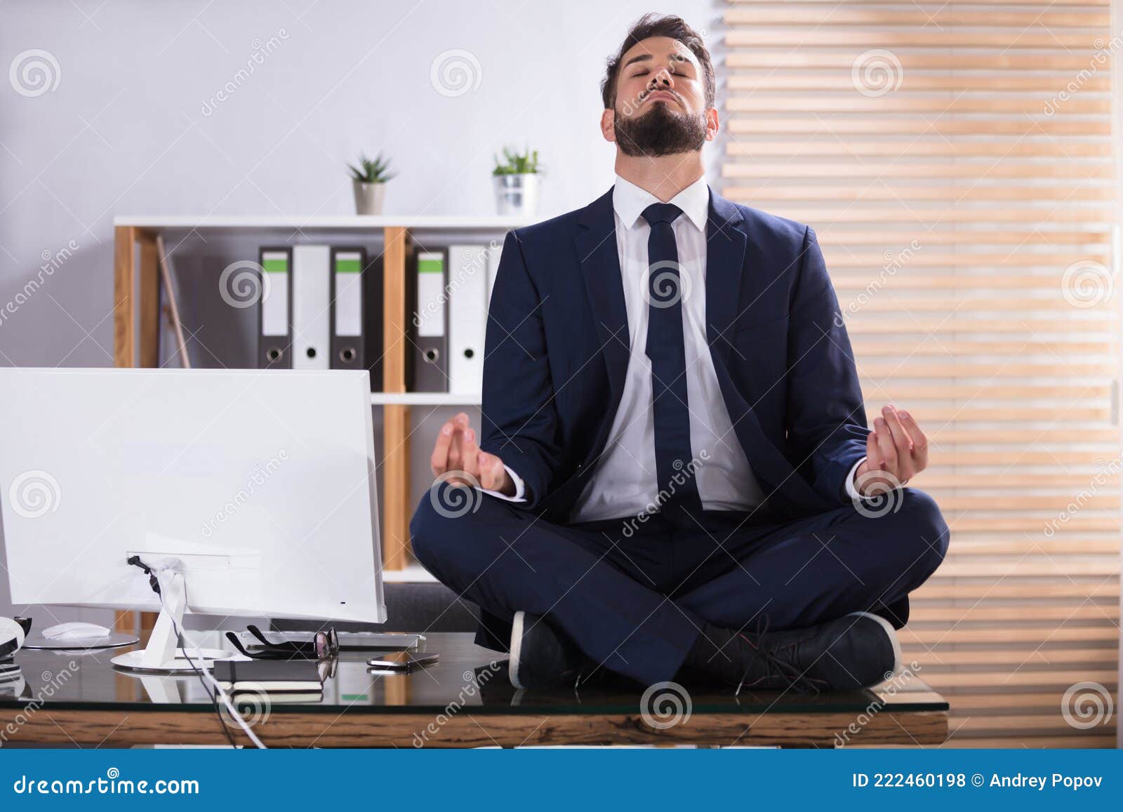 Businessman Doing Meditation in Office Stock Photo - Image of person ...