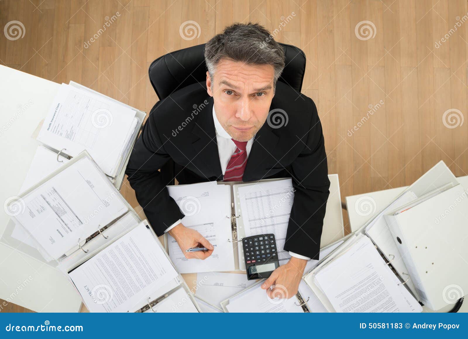 Businessman Doing Paperwork Stock Image - Image of angle, hope: 50581183