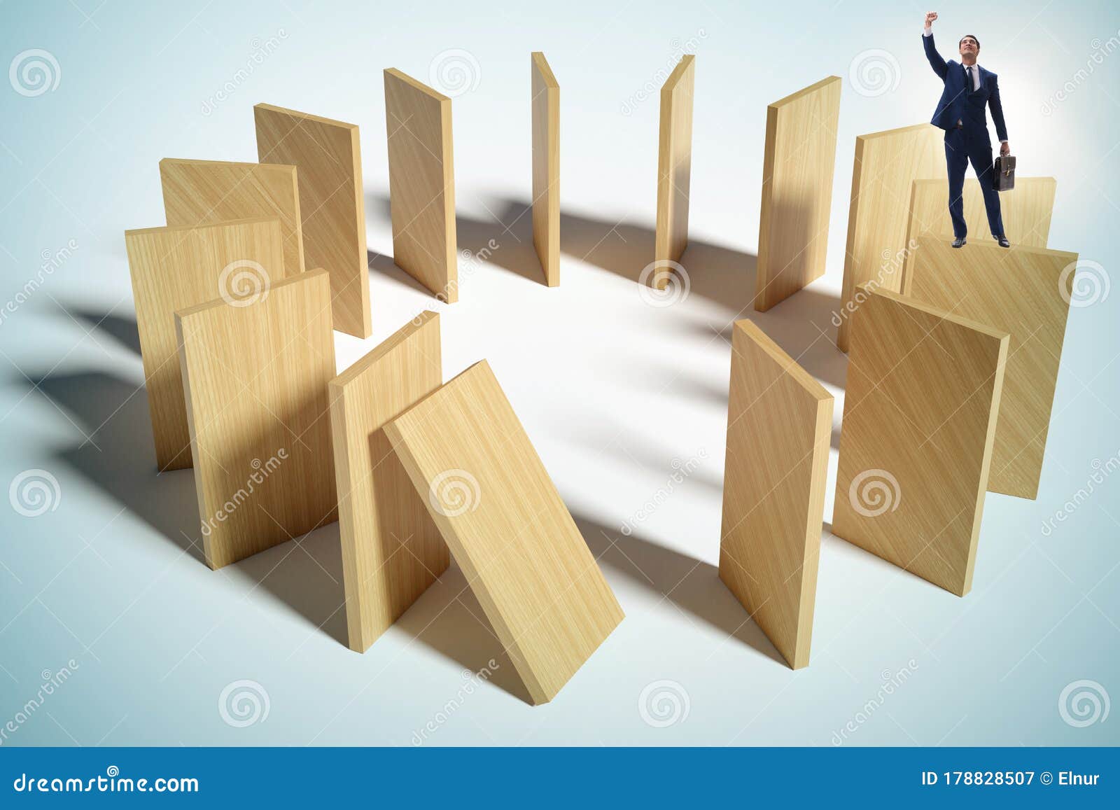 Businessman in Domino Effect Concept Stock Image - Image of falling ...