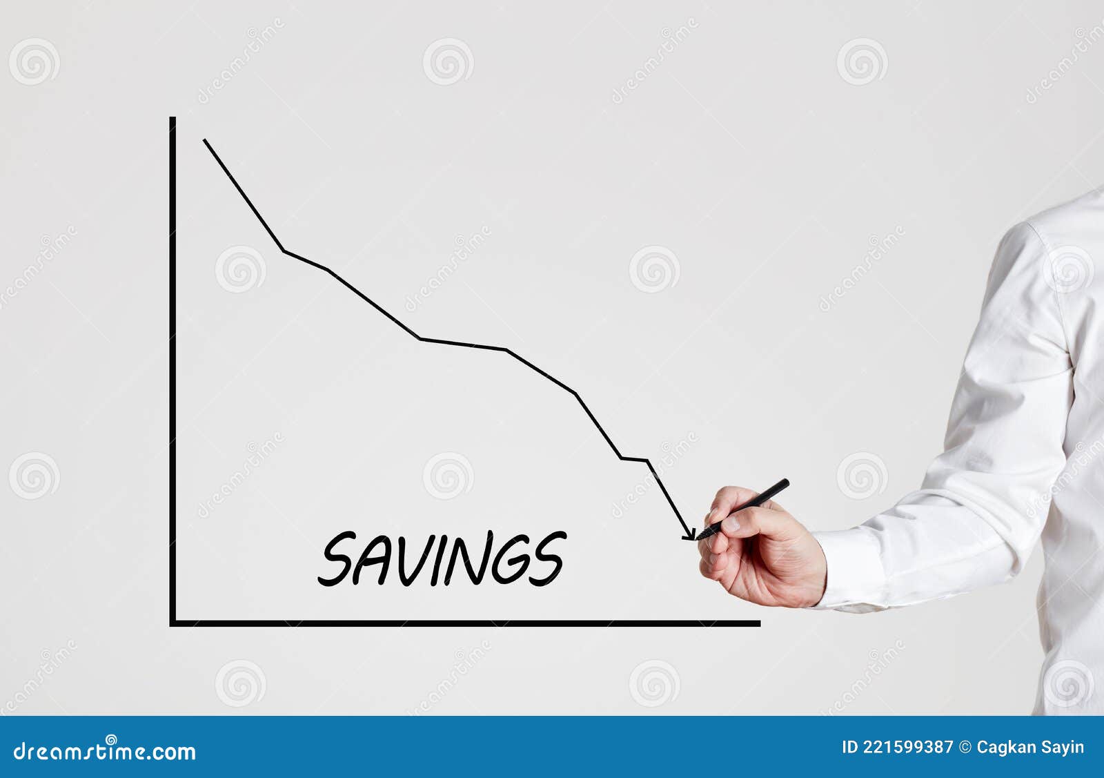 Businessman Draws a Declining Line Graph with the Word Saving. Decrease ...