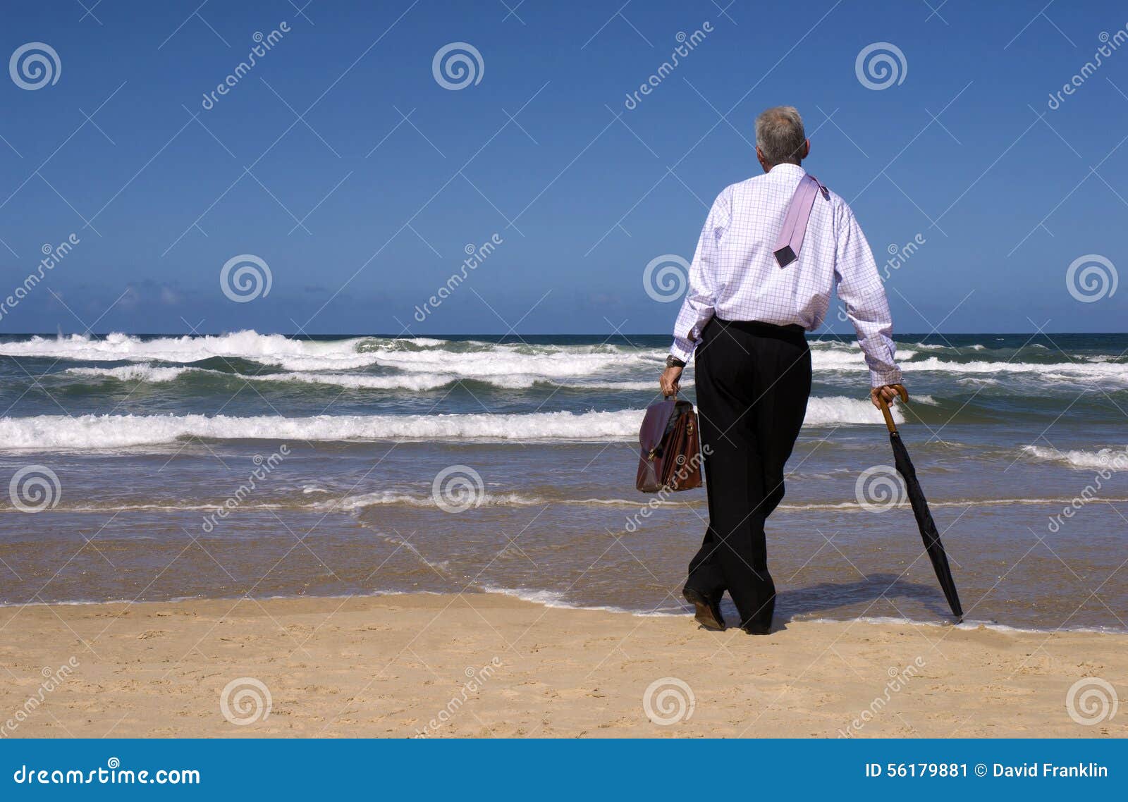 Businessman Dreaming Of Retirement Freedom On A Tropical Beach Copy