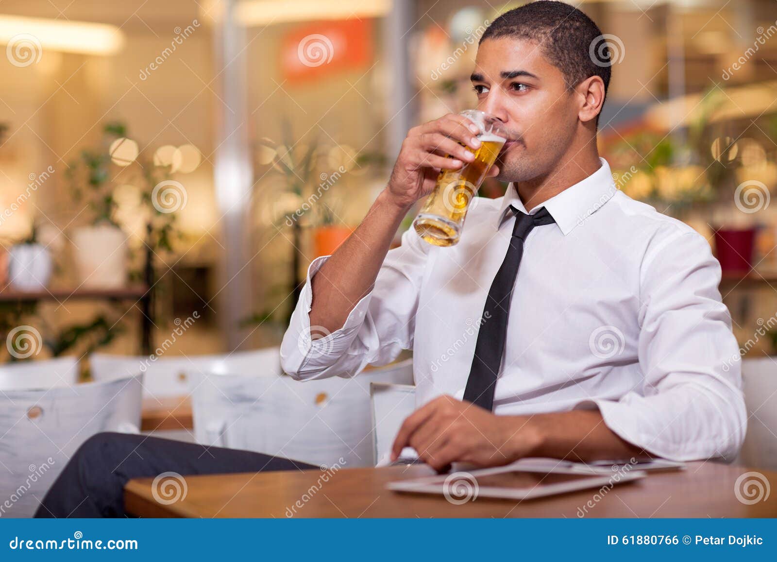 Businessman drinking beer stock photo. Image of adult - 61880766