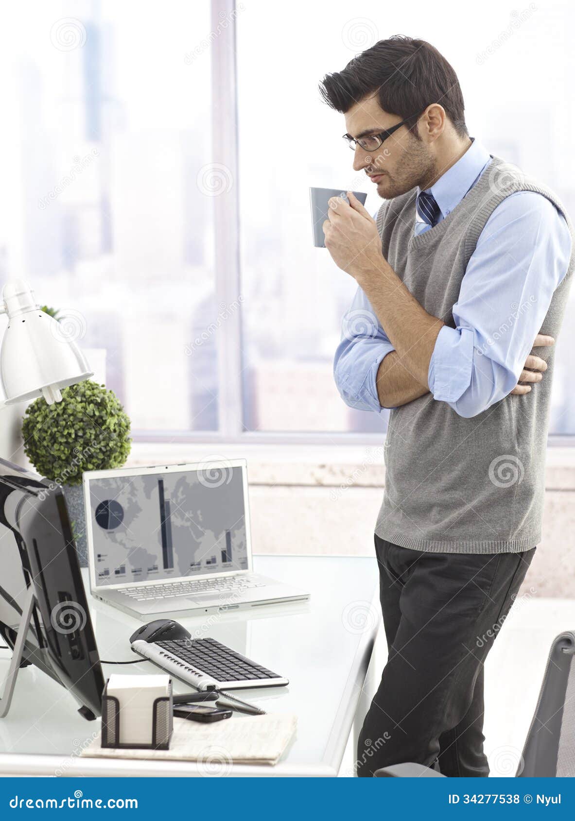 Businessman Drinking Coffee Standing in Office Stock Photo - Image of ...