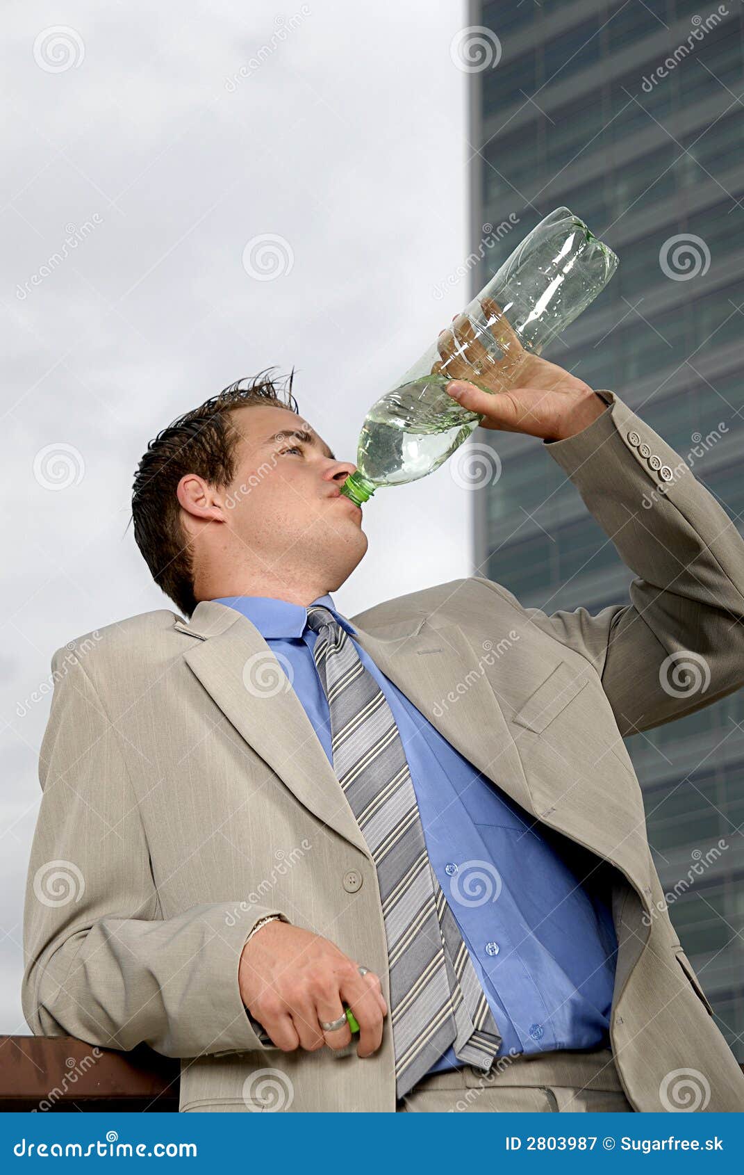 Businessman drinking water stock image. Image of drink - 2803987