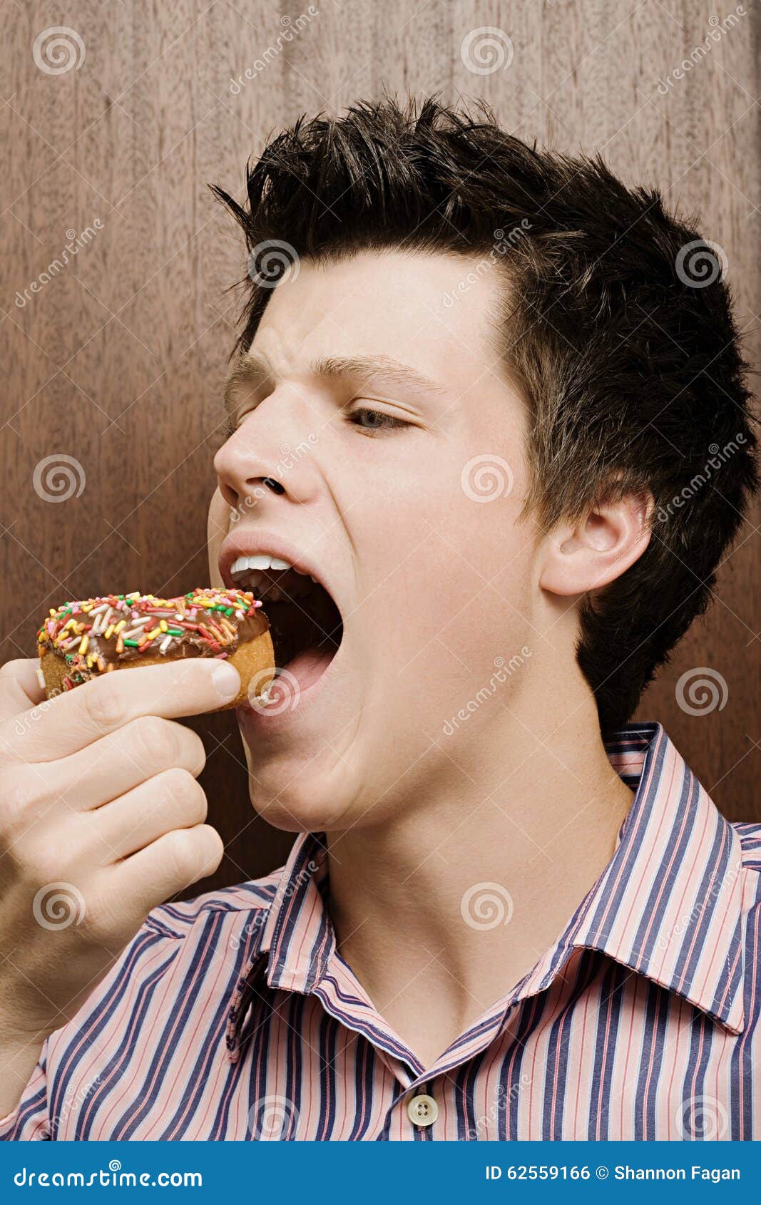 Businessman Eating a Doughnut Stock Photo - Image of greed, eating ...