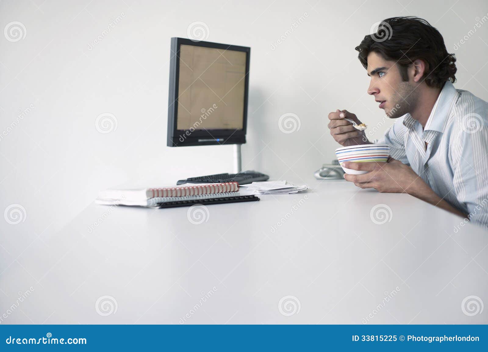 Businessman Eating at Office Desk Stock Image - Image of employee ...
