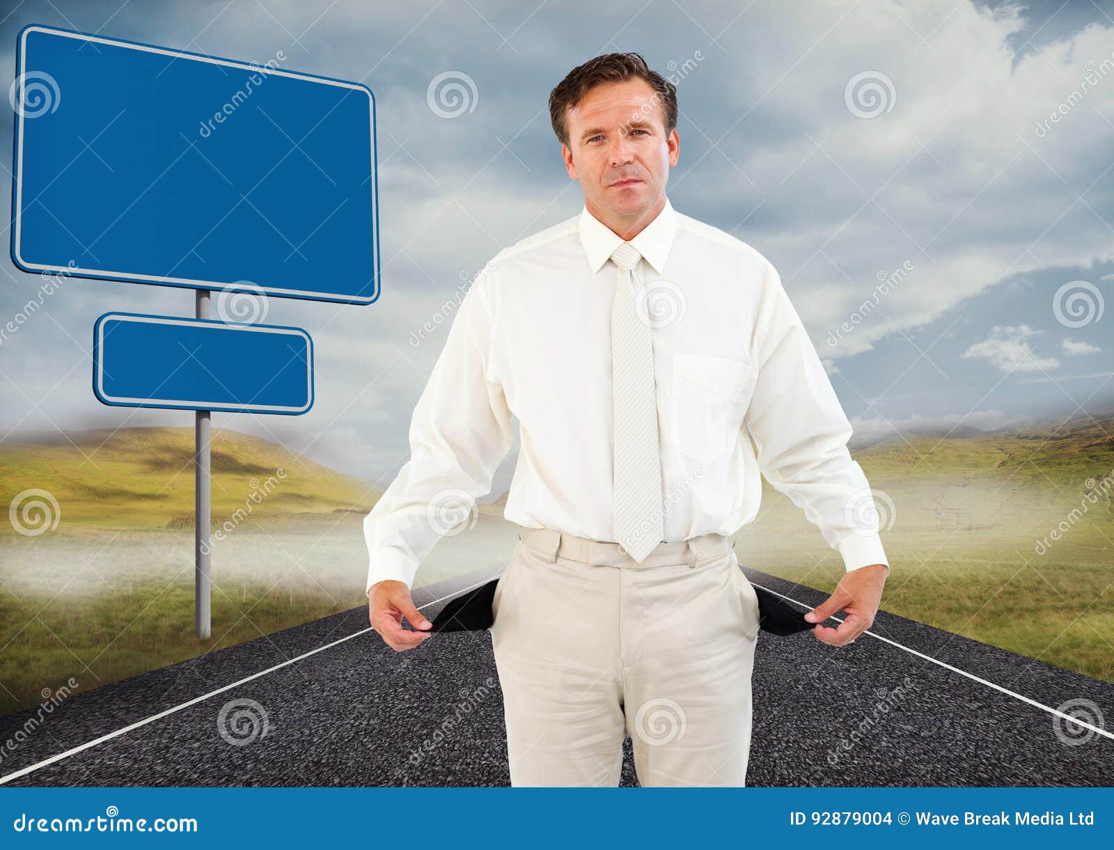 Businessman with Empty Pockets on Road by Blank Signs Stock Photo ...