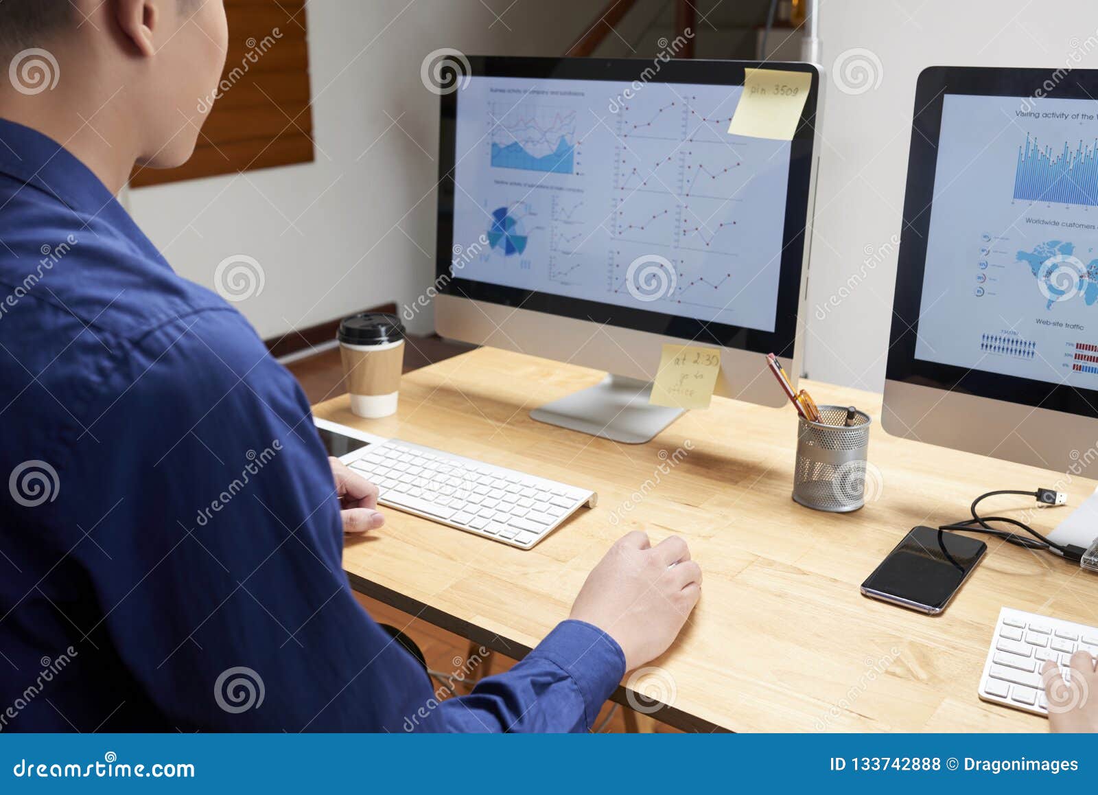 Businessman Examining Data on Computer Screen Stock Photo - Image of ...