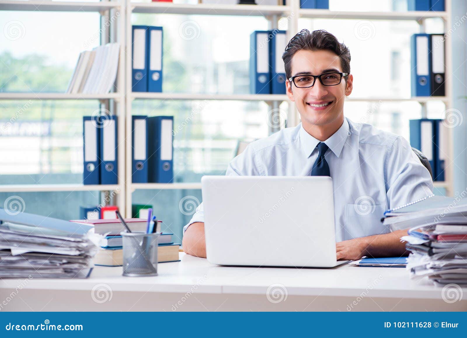 The Businessman with Excessive Work Paperwork Working in Office Stock ...