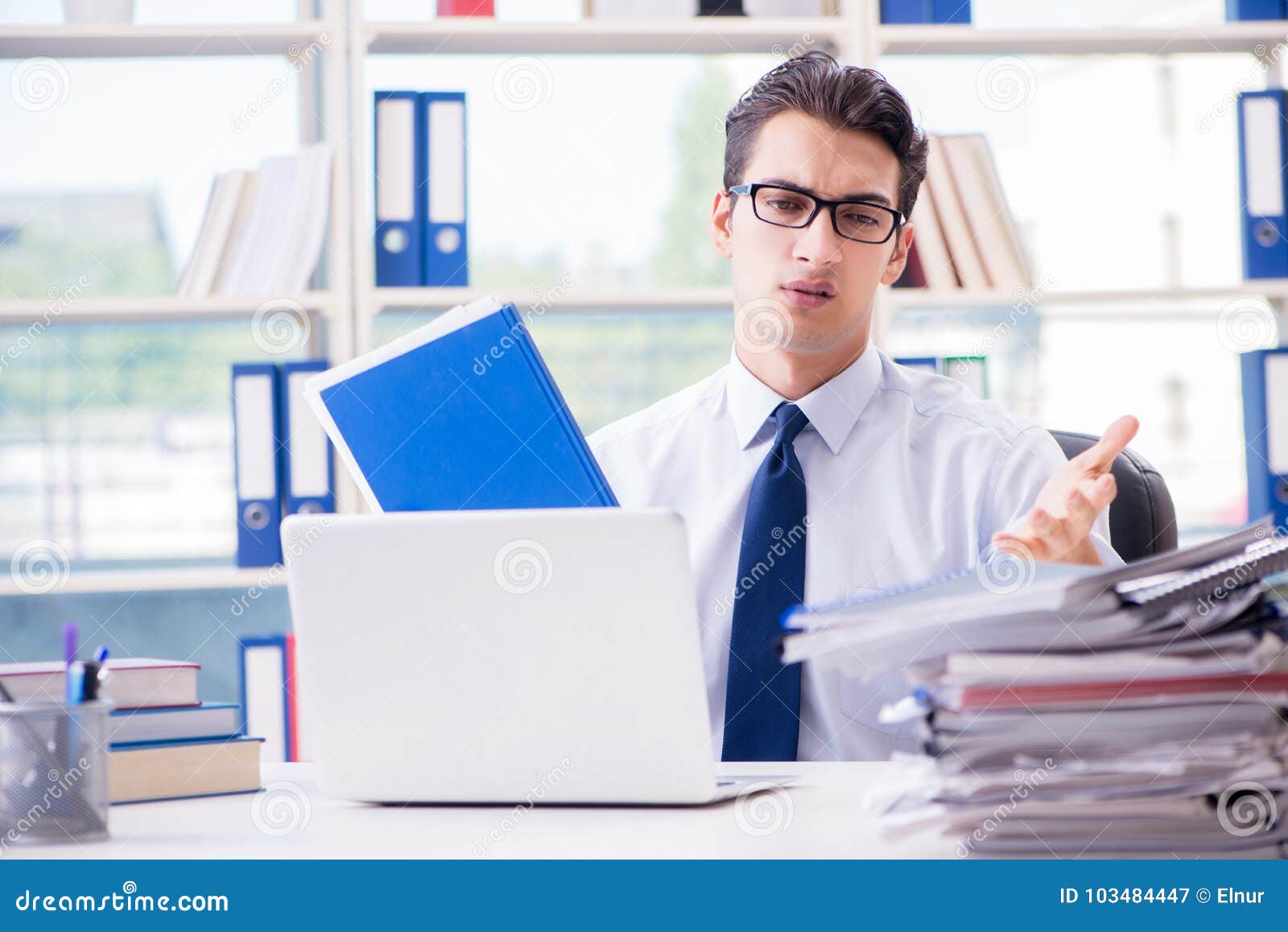 The Businessman with Excessive Work Paperwork Working in Office Stock ...
