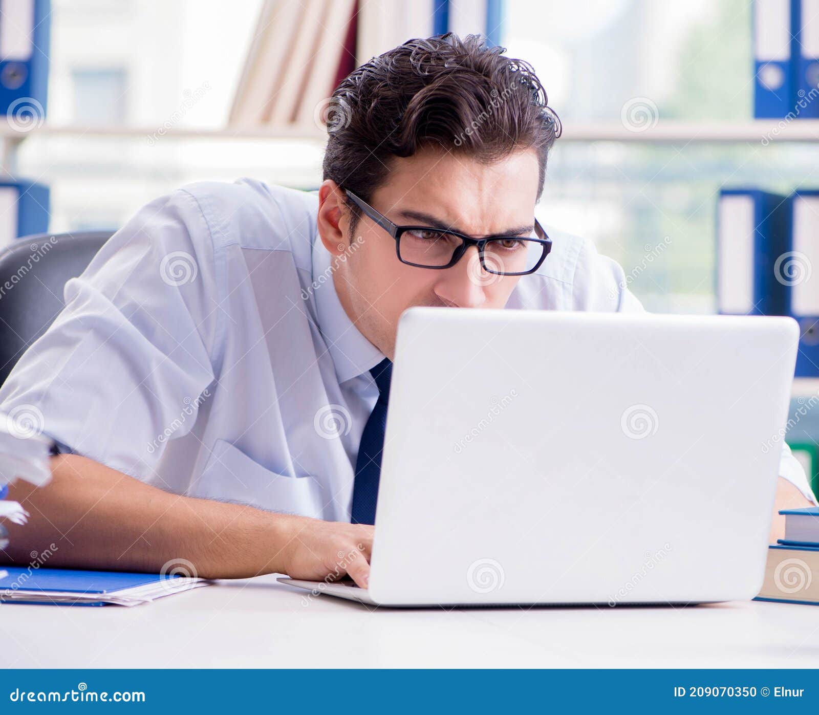 Businessman with Excessive Work Paperwork Working in Office Stock Photo ...