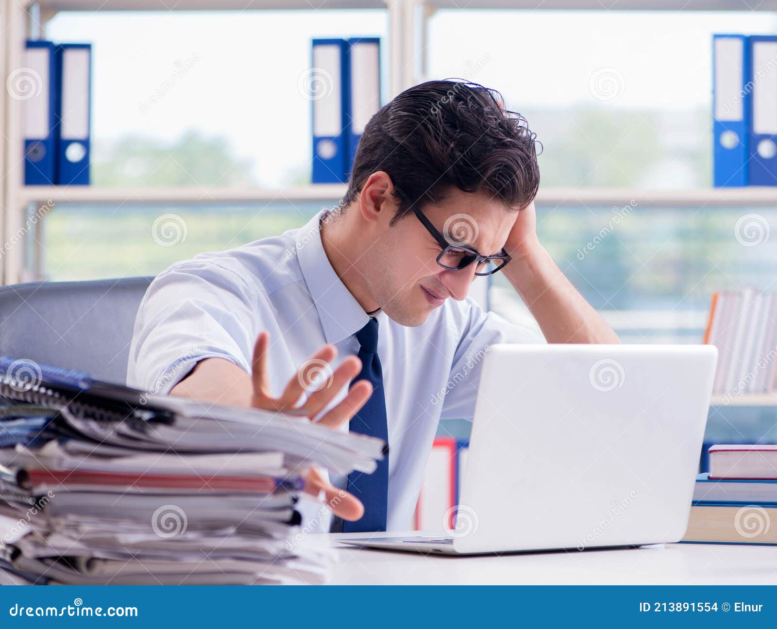Businessman with Excessive Work Paperwork Working in Office Stock Photo ...