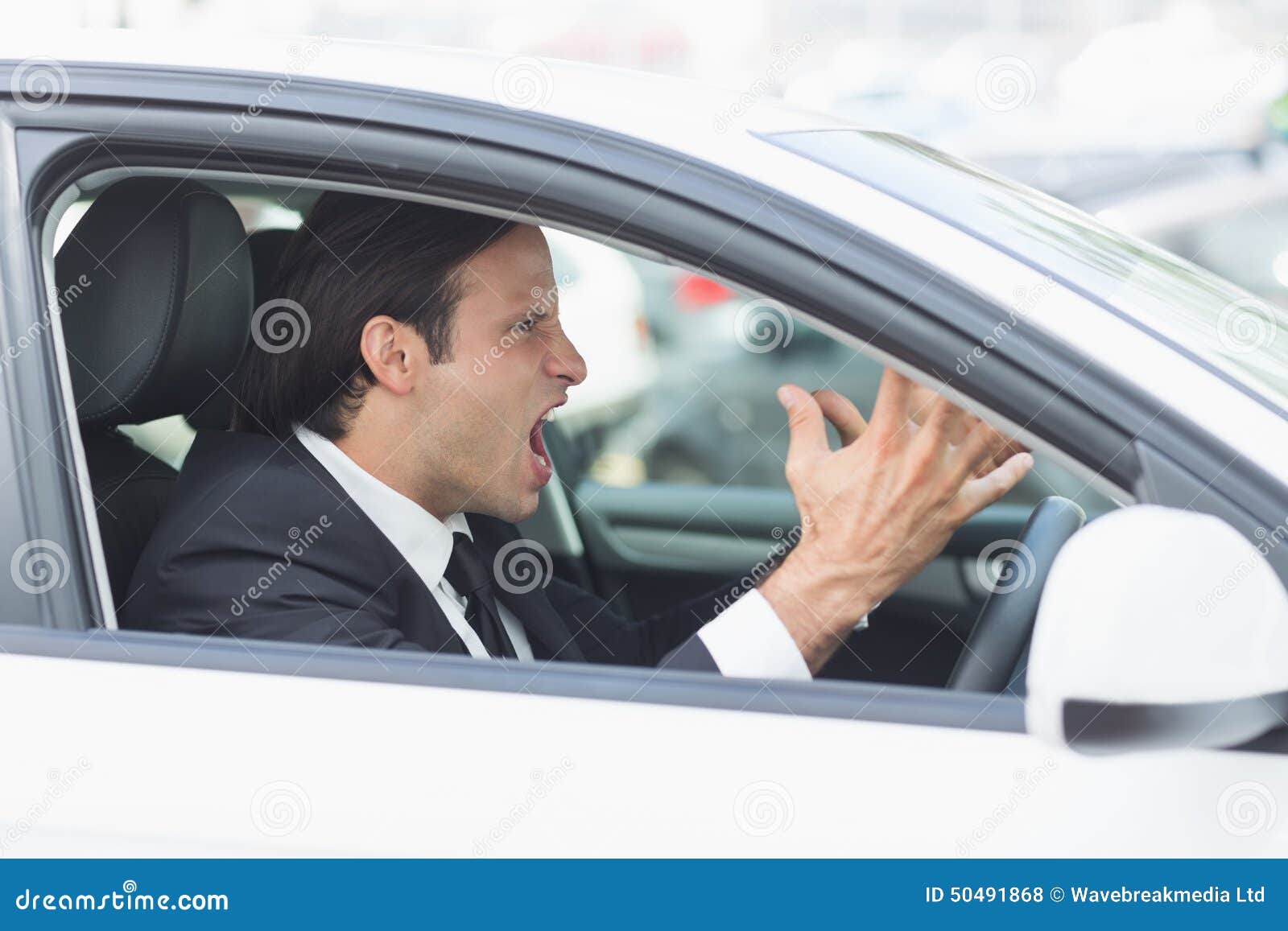 Businessman Experiencing Road Rage Stock Photo - Image of annoyed ...