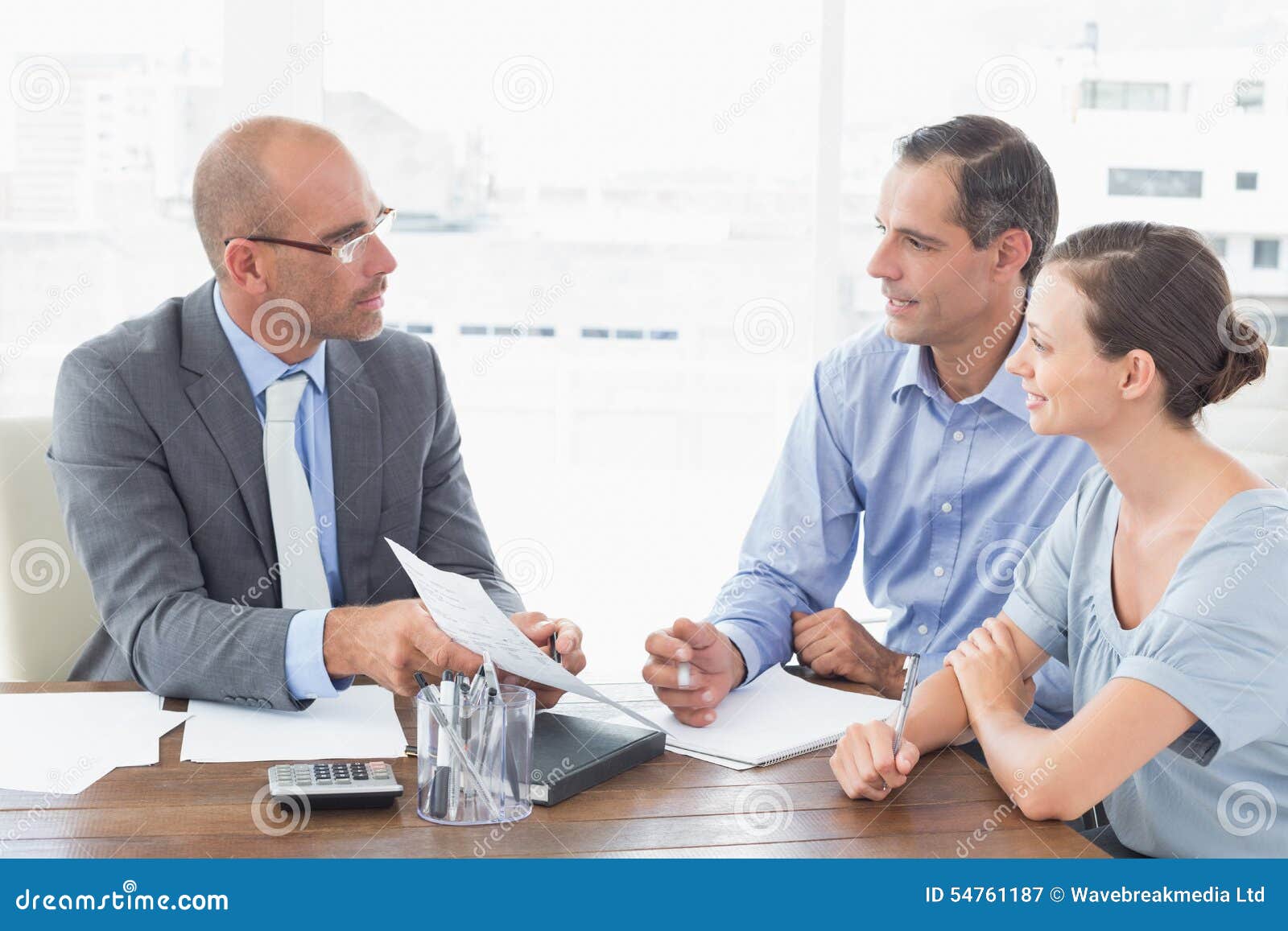 Businessman Explaining Contract To Business Partners Stock Image ...