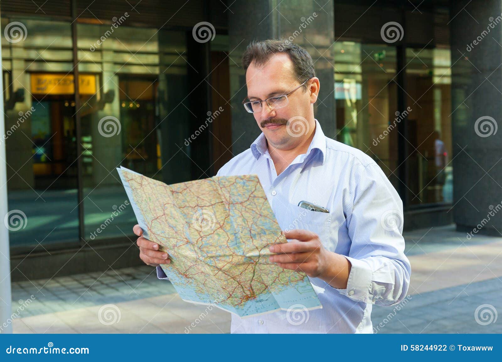 Businessman Exploring the City Guide Stock Photo - Image of person ...