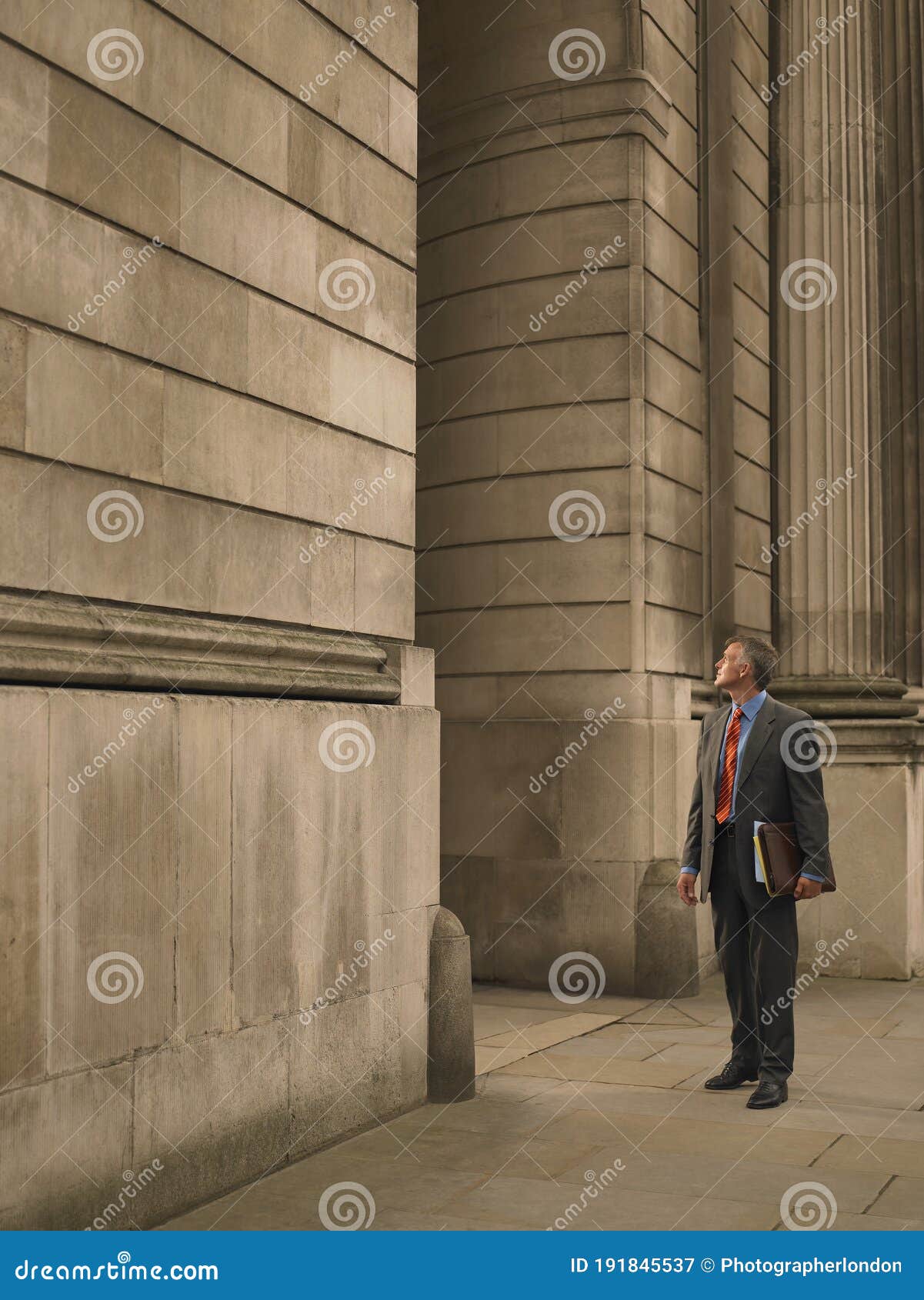 Businessman Facing Monumental Building Stock Image - Image of standing ...