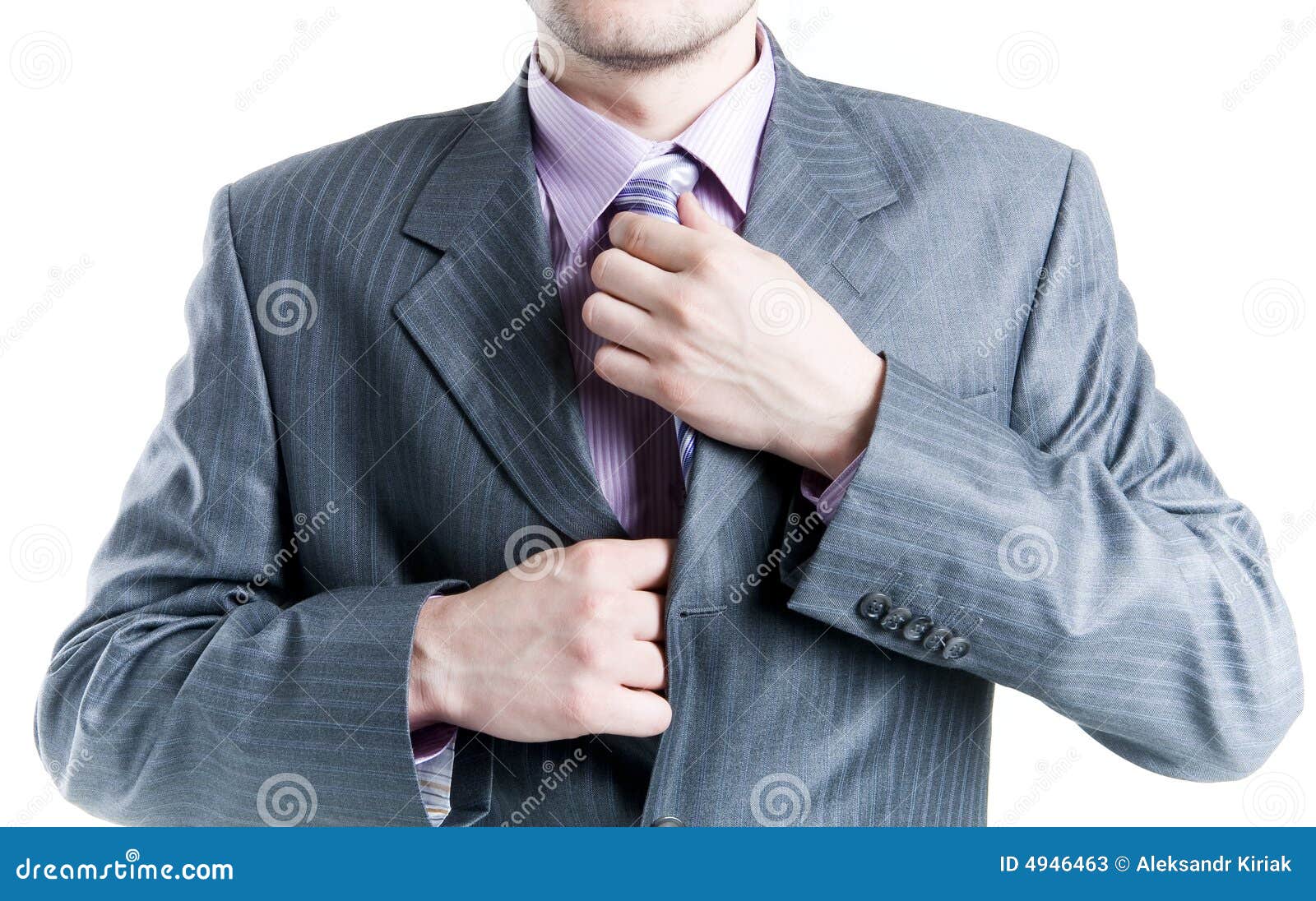 Businessman fastening tie stock image. Image of business - 4946463