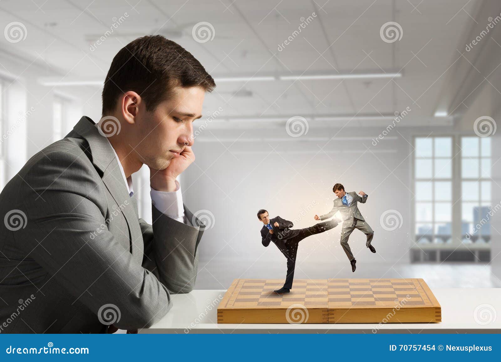 Businessman Fighting on the Chessboard Stock Photo - Image of ...