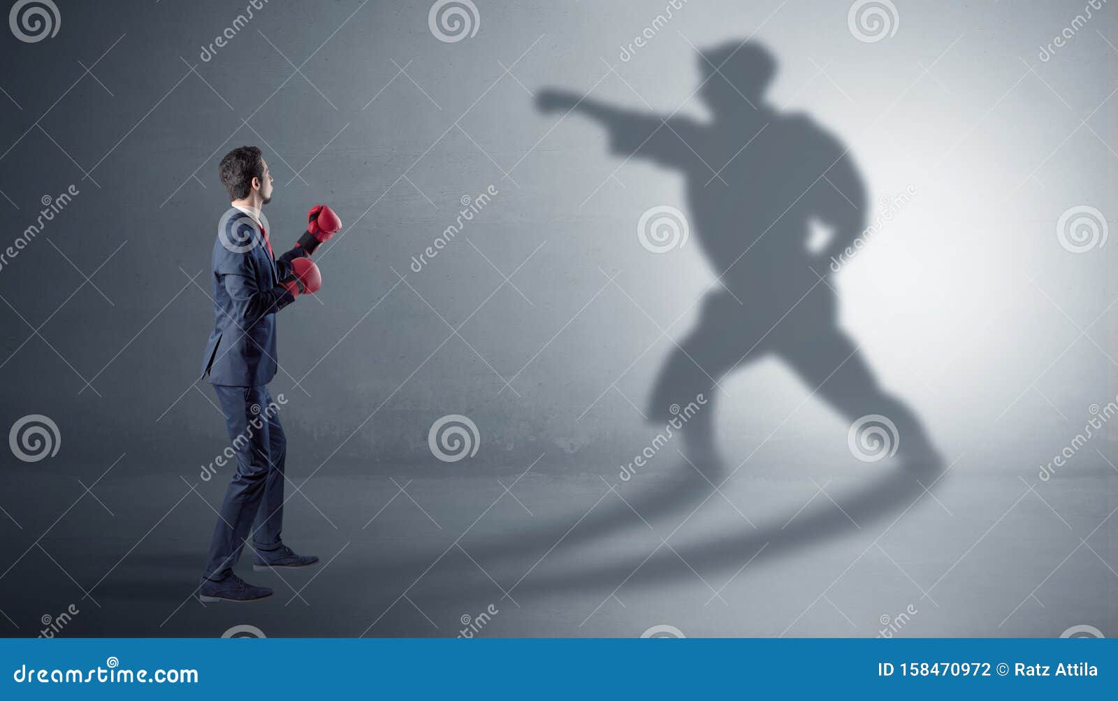 Young Businessman Fighting with His Shadow Stock Photo - Image of ...