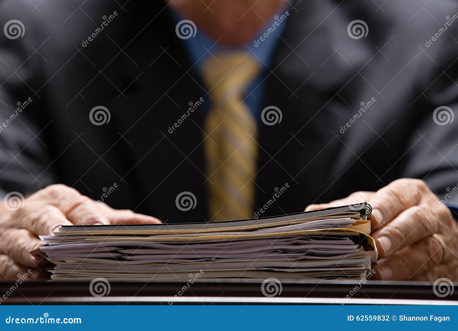 Businessman with files stock photo. Image of holding - 62559832