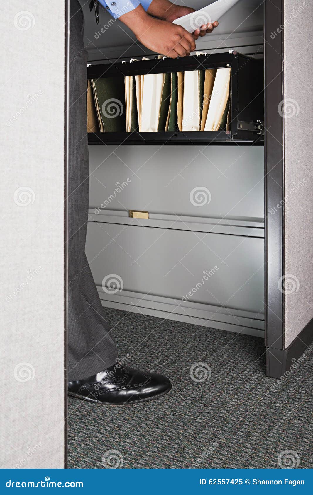 Man Filing Paperwork Stock Photo | CartoonDealer.com #11726412