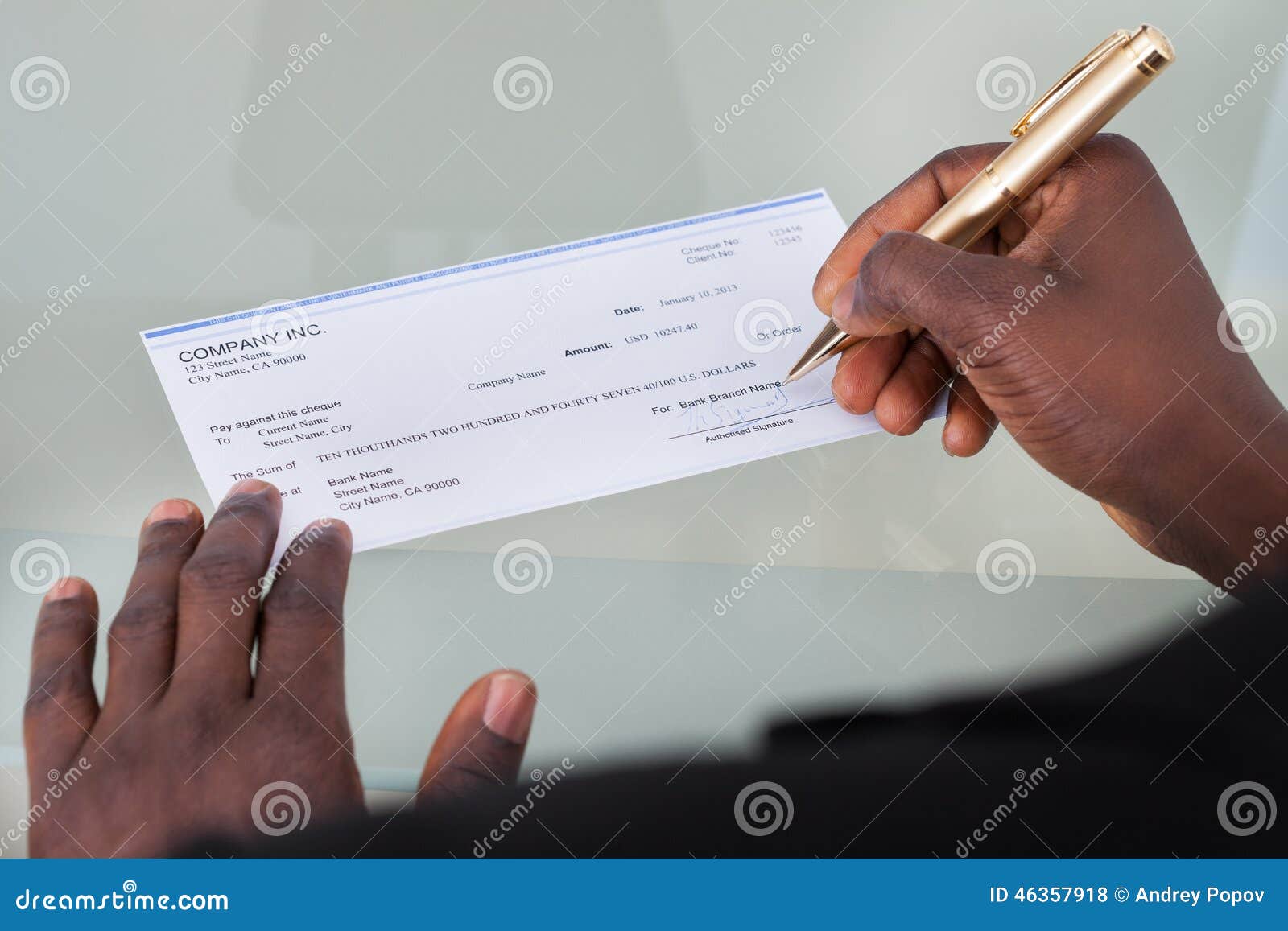 Businessman filling cheque stock photo. Image of african - 46357918