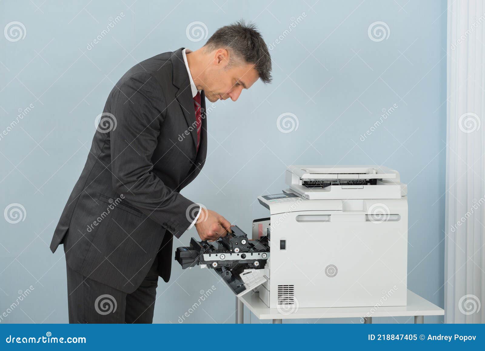 Businessman Fixing Cartridge in Printer Machine at Office Stock Image ...