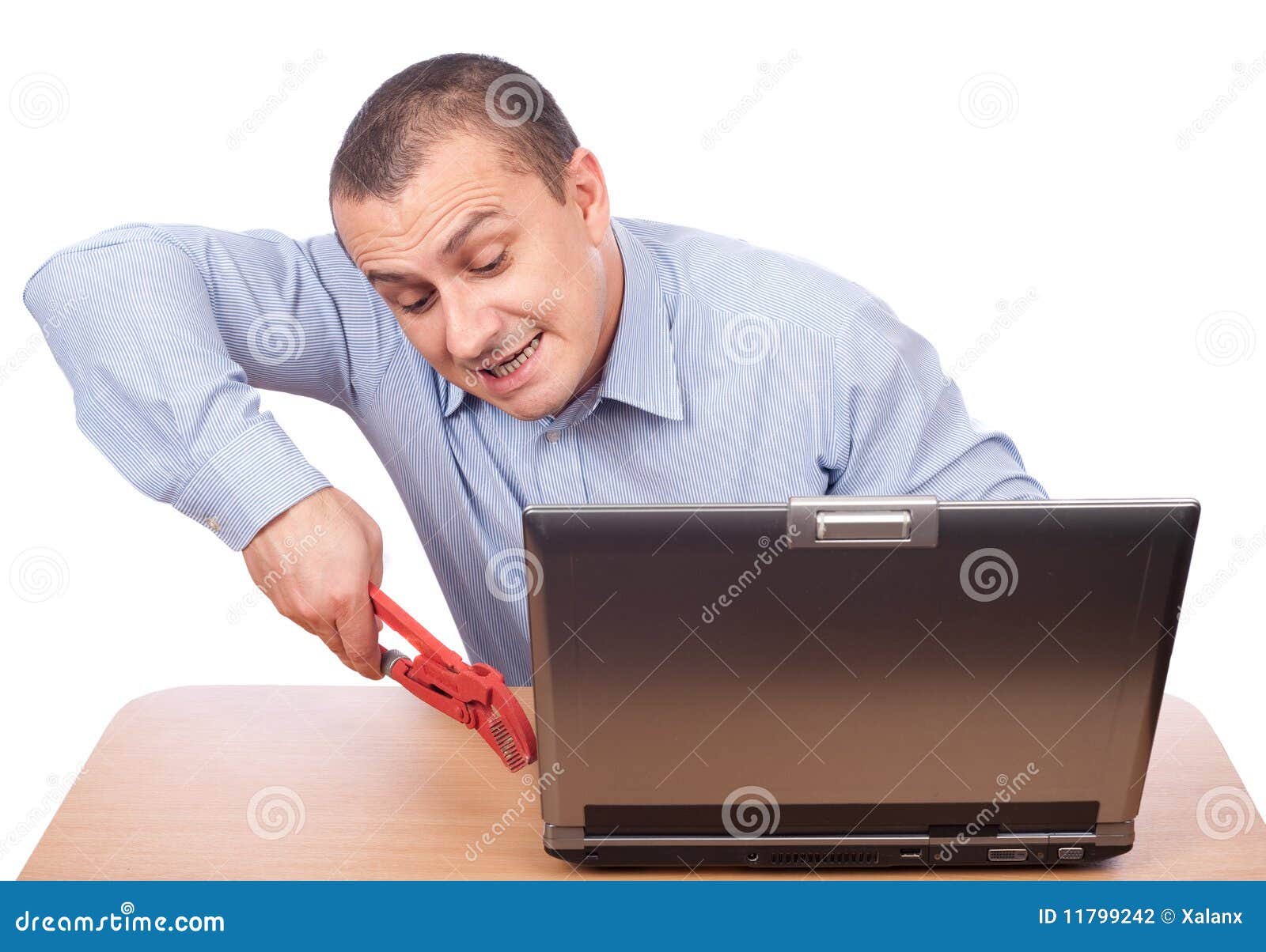 Businessman fixing laptop stock photo. Image of anger - 11799242