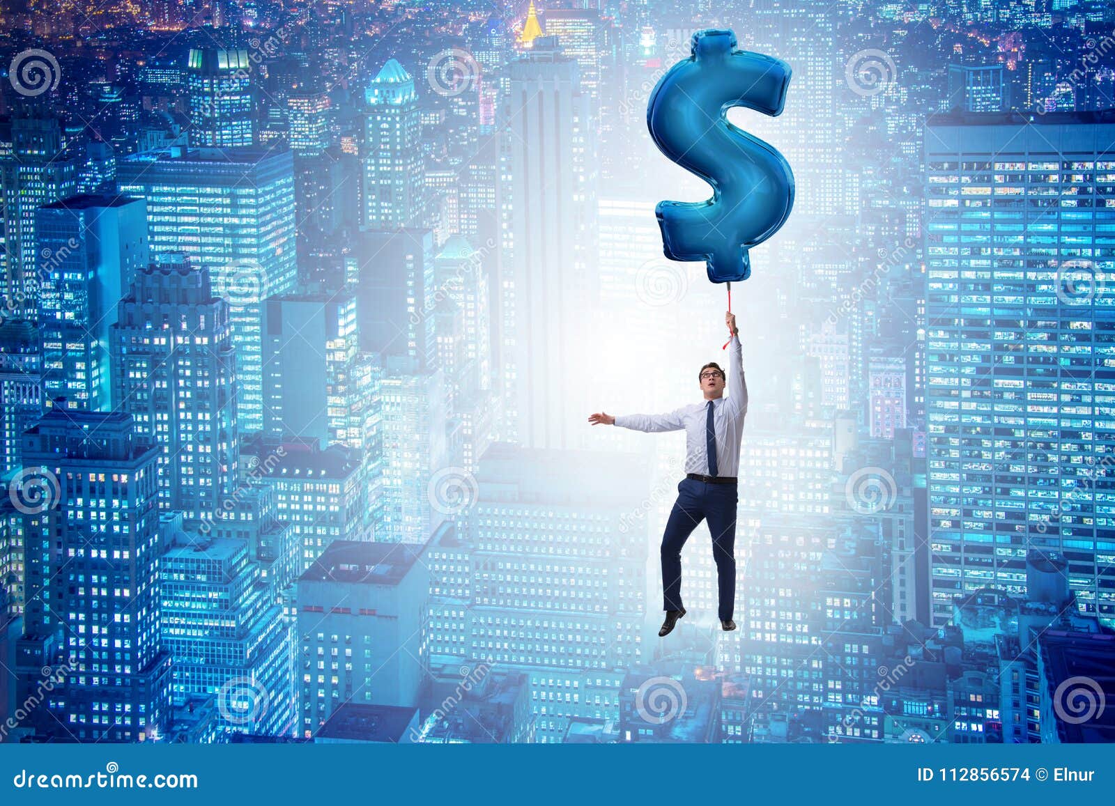 The Businessman Flying on Dollar Sign Inflatable Balloon Stock Photo ...