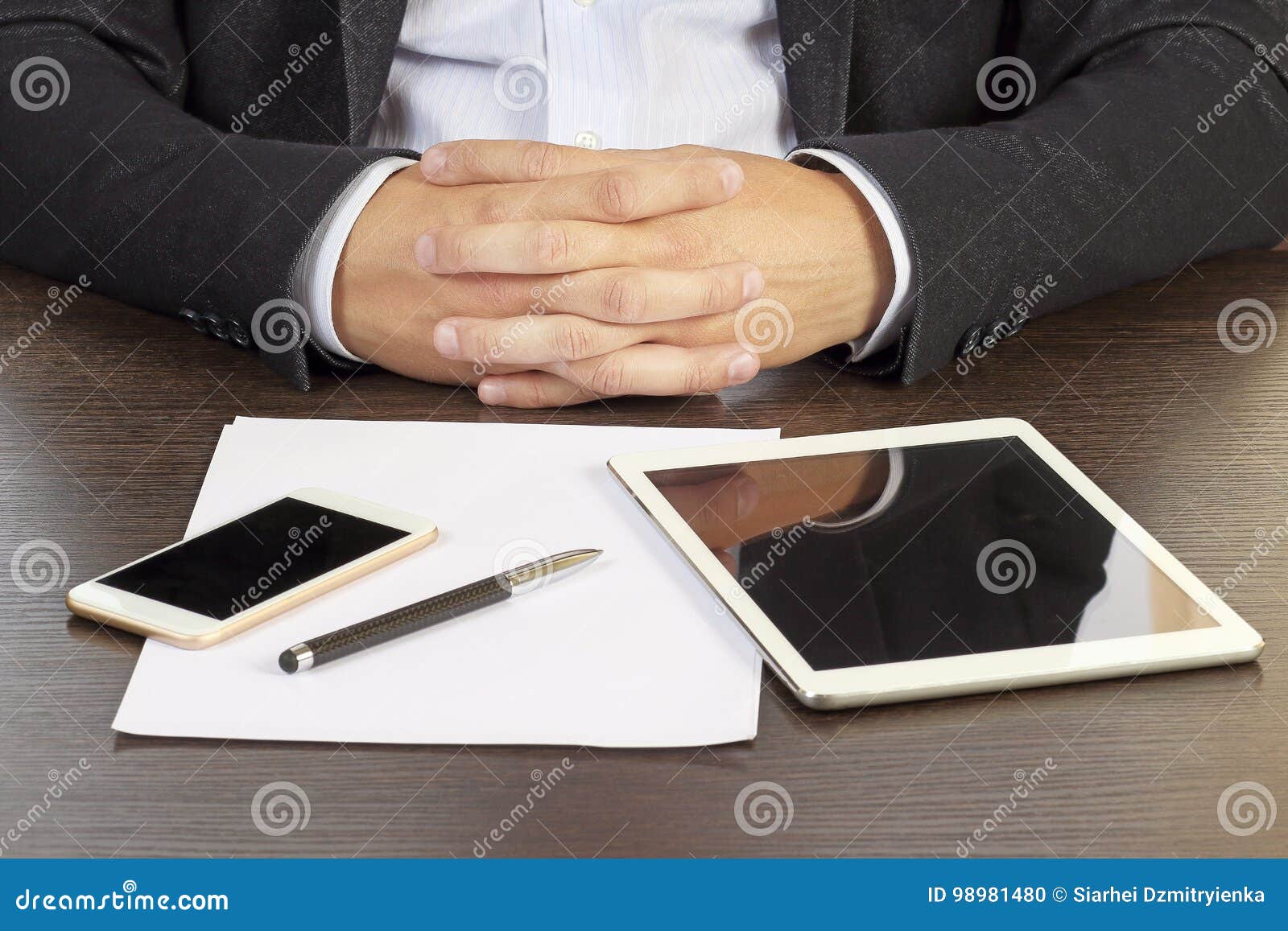 Businessman Folded His Hands at the Desk Close-up. Stock Photo - Image ...