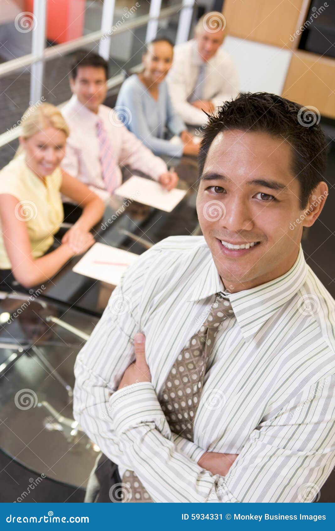 Businessman with Four Businesspeople Stock Image - Image of colleagues ...