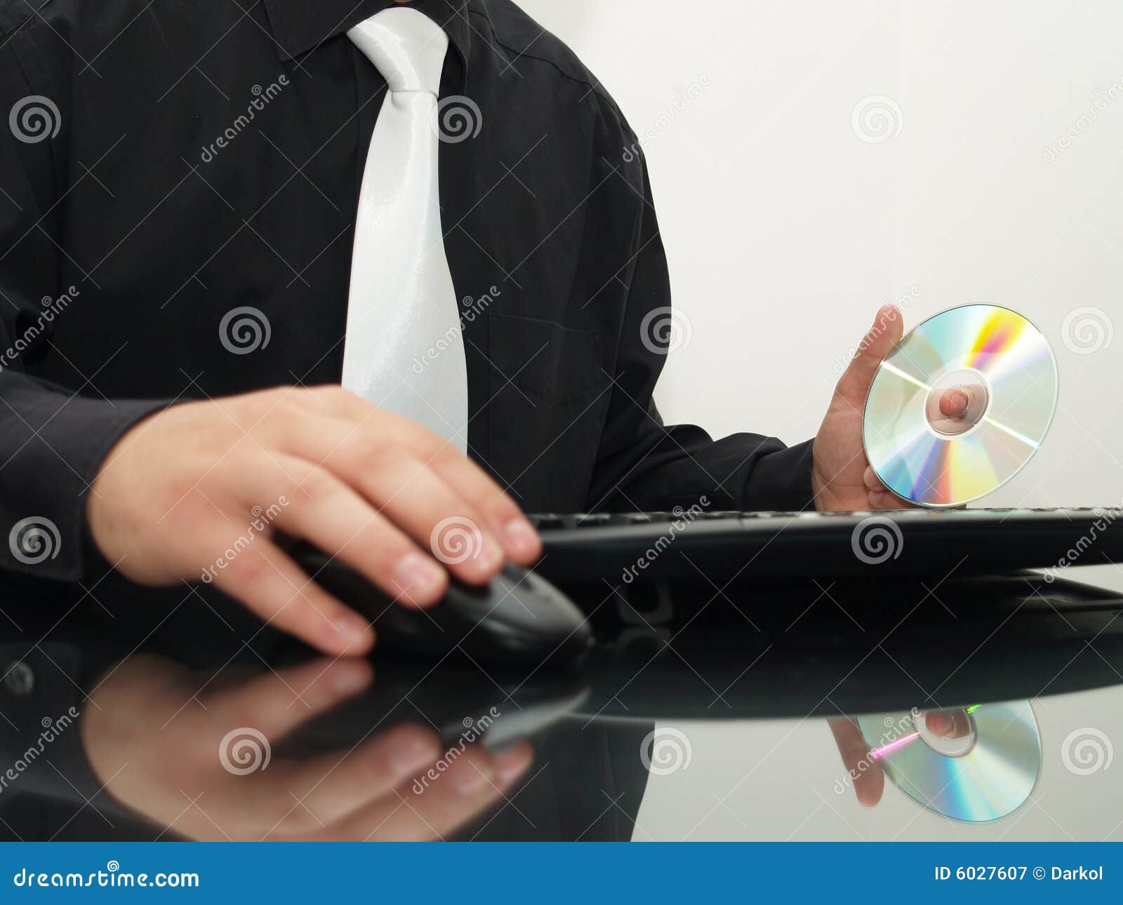 Businessman in Front of a Computer, Holding a Disc Stock Image - Image ...