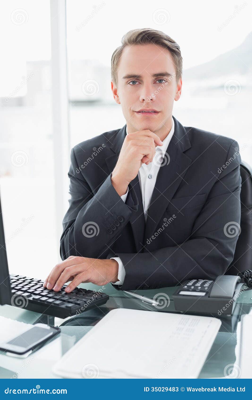 Businessman in Front of Computer at Office Desk Stock Image - Image of ...