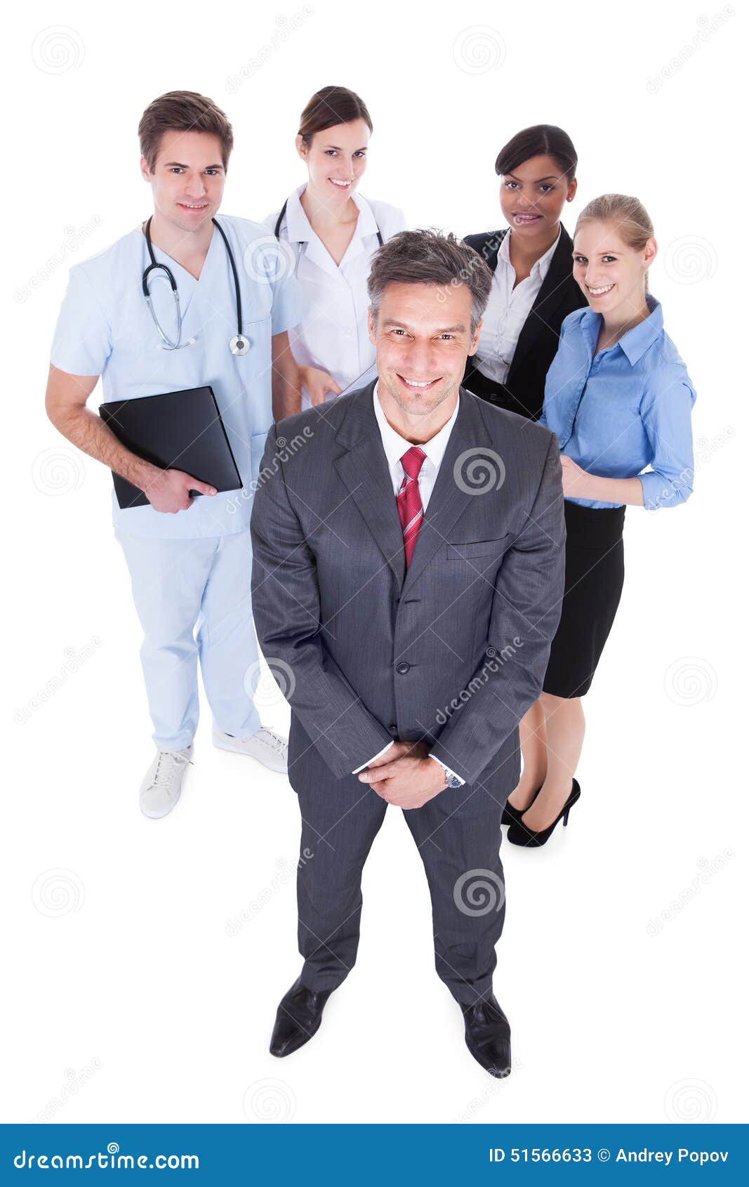 Businessman in Front of Professional Workers Stock Image - Image of ...