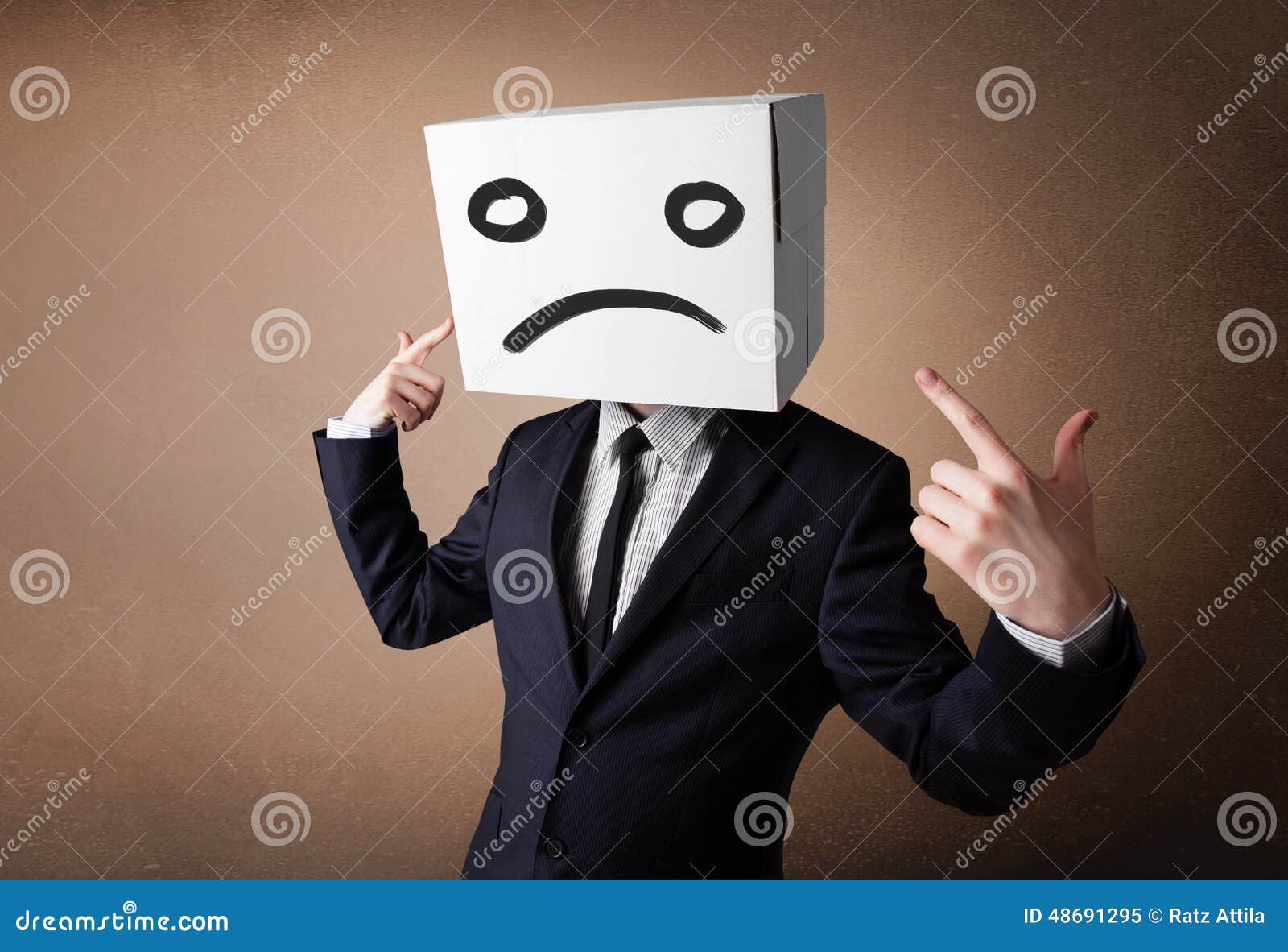 Businessman Gesturing With Cardboard Box On His Head With Sad Fa Stock ...