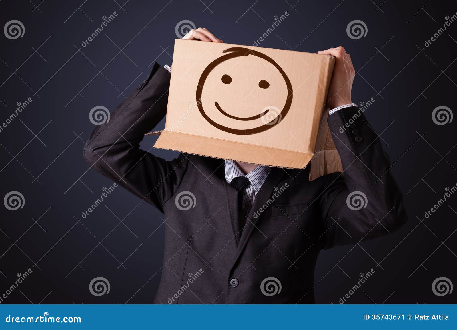 Businessman Gesturing with a Cardboard Box on His Head with Smiley Face ...