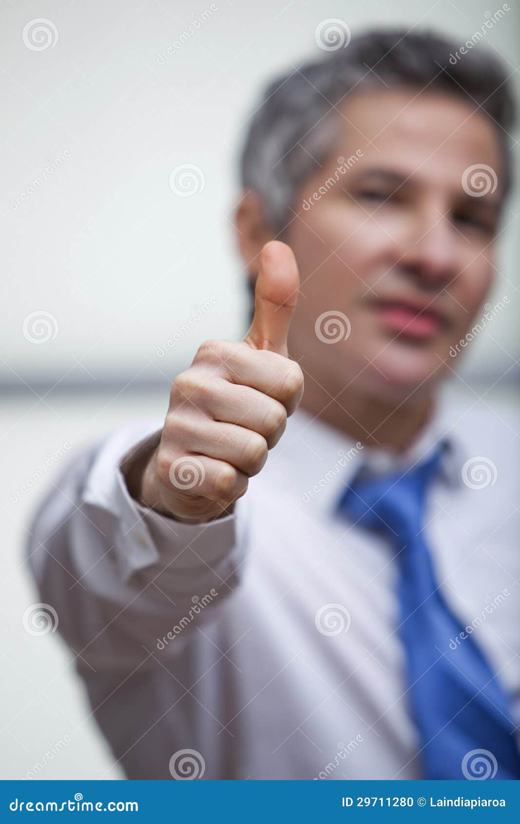 Businessman with thumb up stock photo. Image of male - 29711280