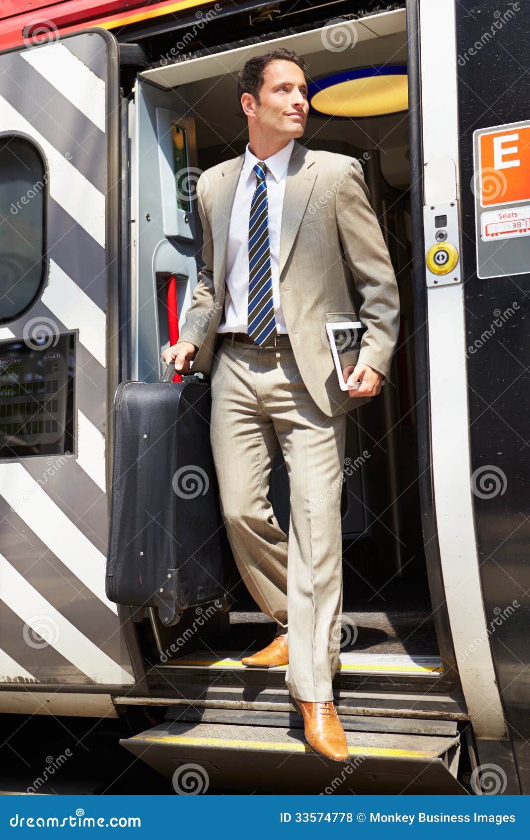 Businessman Getting Off Train at Platform Stock Photo - Image of person ...