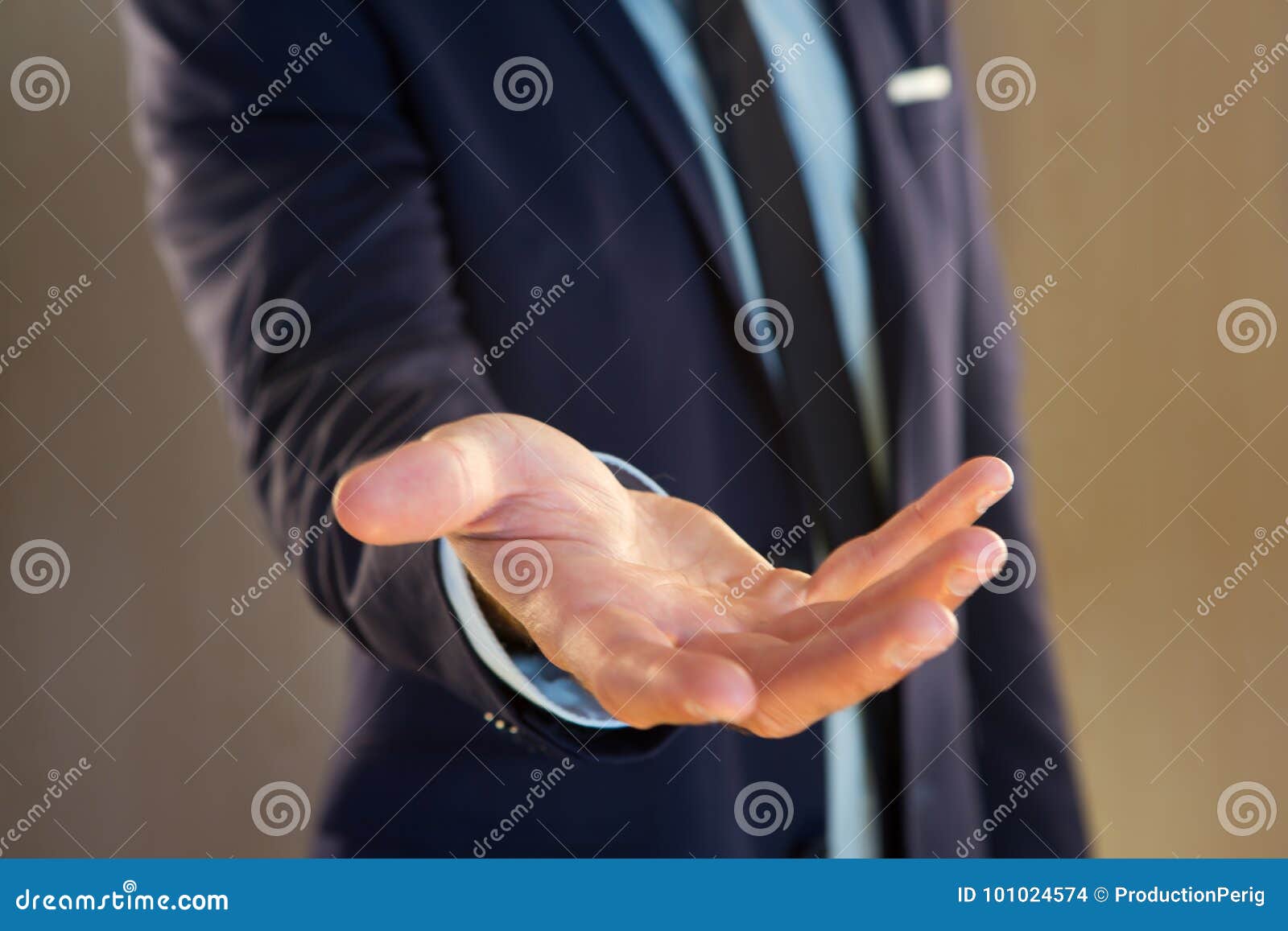 Businessman Giving an Empty Hand on a Color Background Stock Photo ...