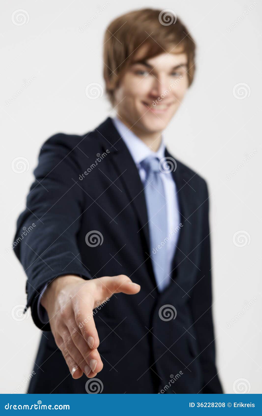 Businessman Giving a Handshake Stock Photo - Image of business, person ...