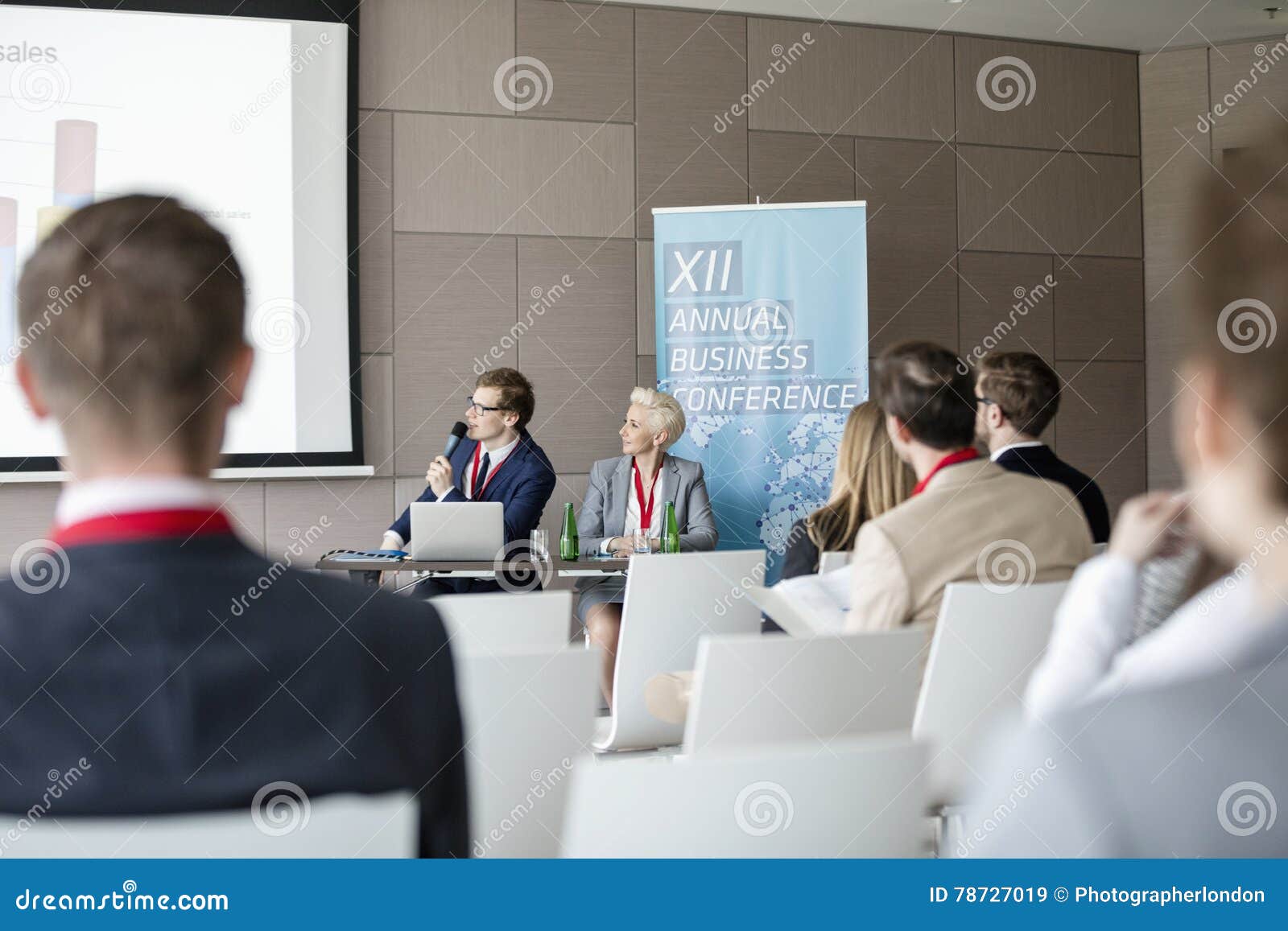 Businessman Giving Presentation in Seminar Hall Stock Image - Image of ...