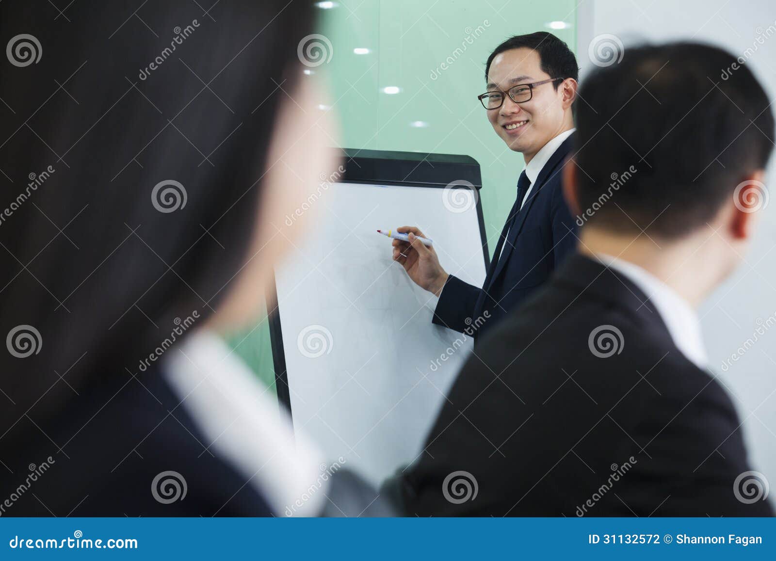 Businessman Giving Presentation and Smiling Stock Photo - Image of 3034 ...