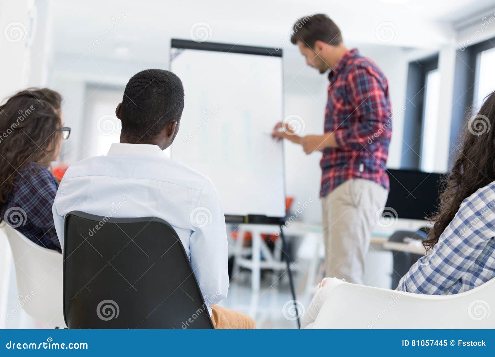 Businessman Giving a Presentation To His Colleagues at Work Stock Image ...
