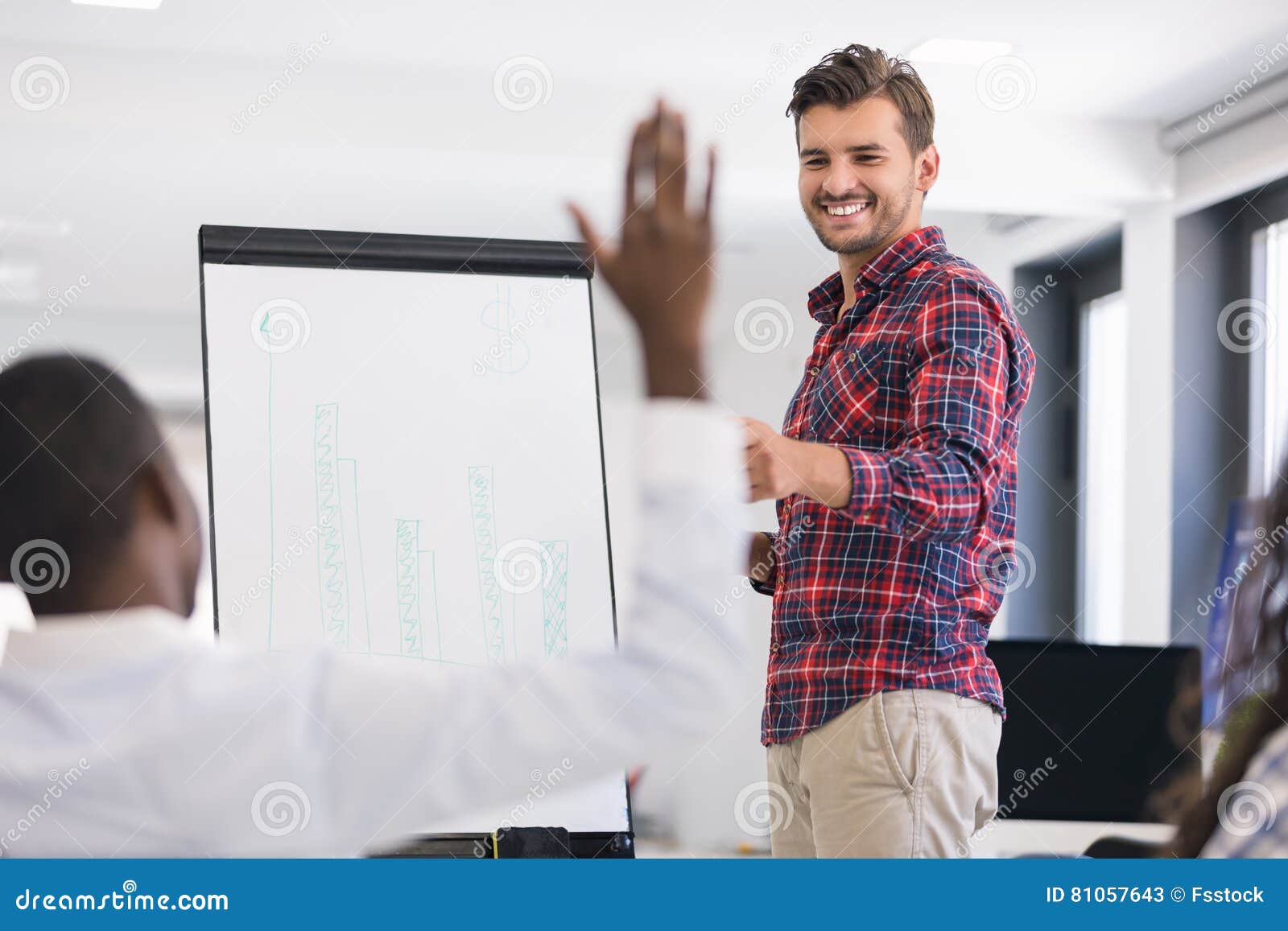 Businessman Giving a Presentation To His Colleagues at Work Stock Image ...